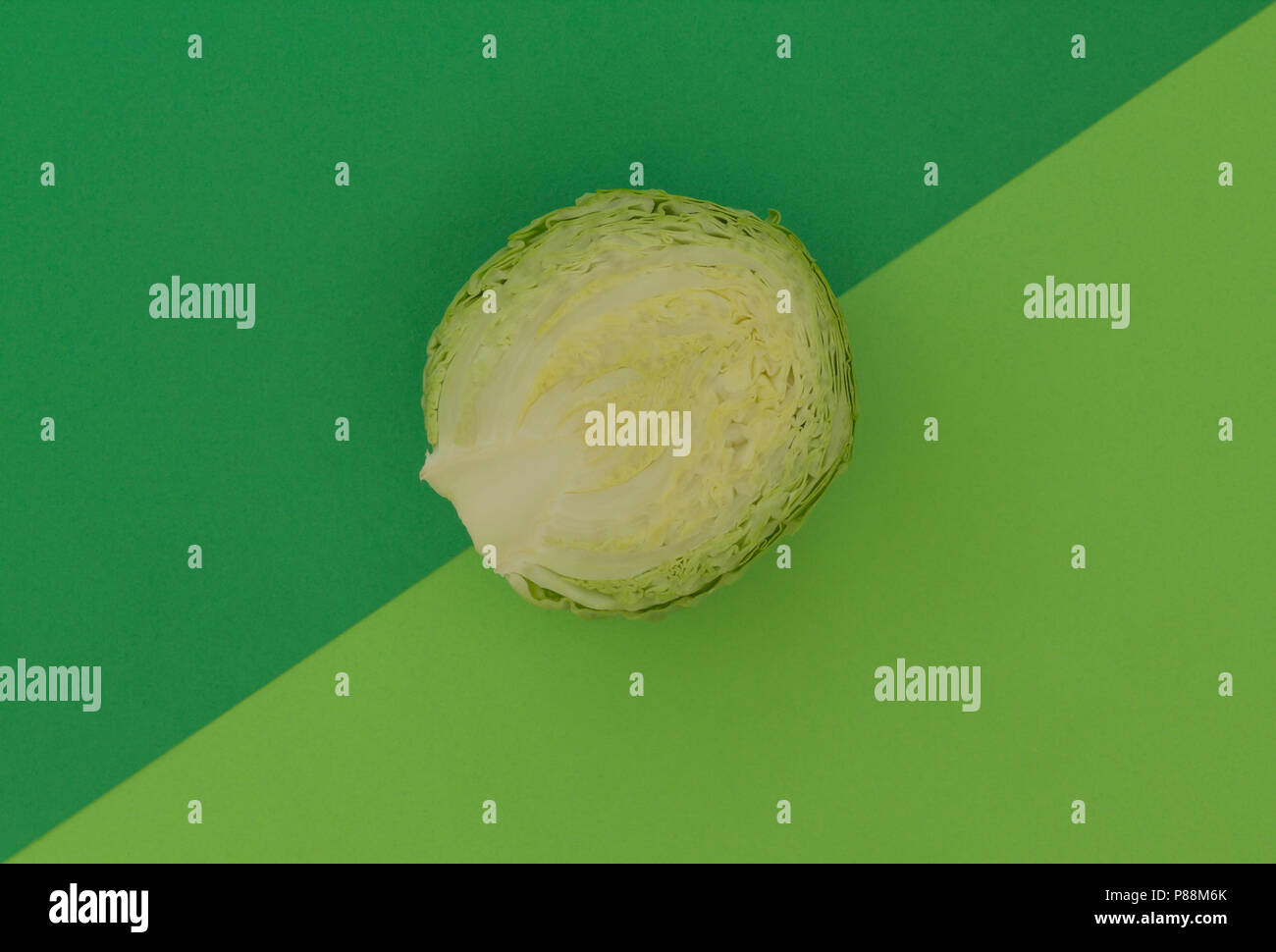 Fresh green cabbage on a background of similar (analogous colors ...