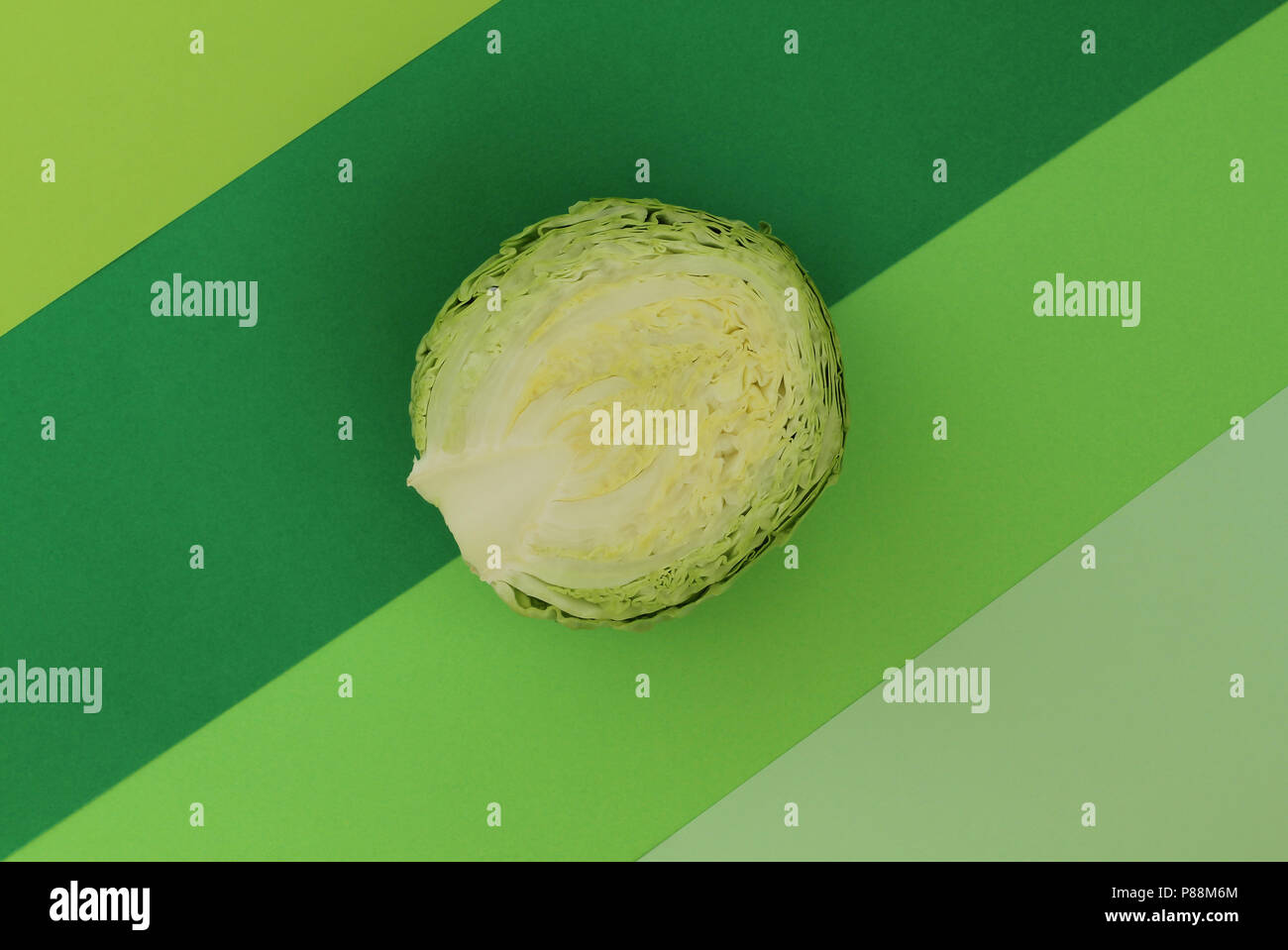 Fresh green cabbage on a background of similar (analogous colors ...