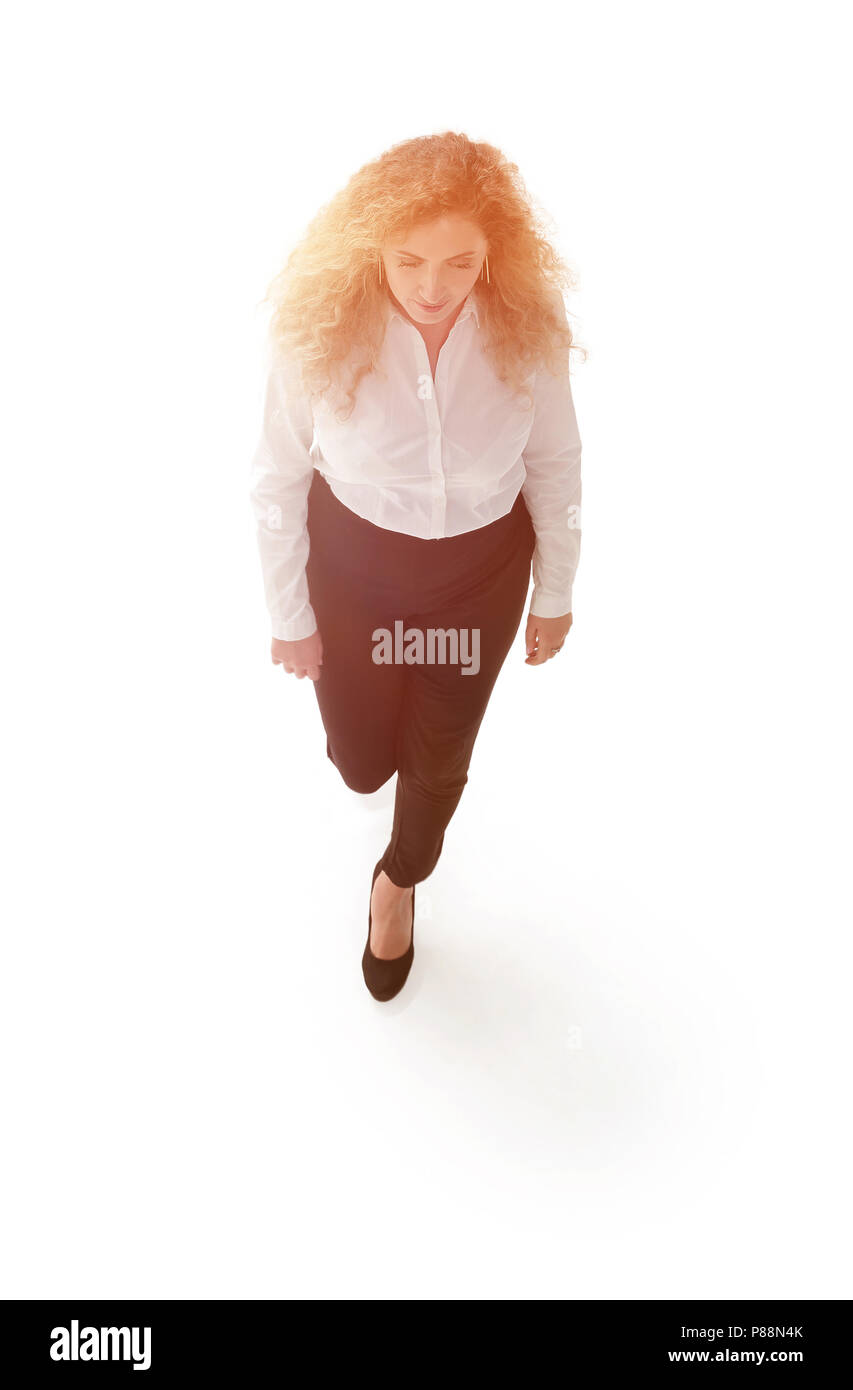Executive business woman goes forward Stock Photo - Alamy