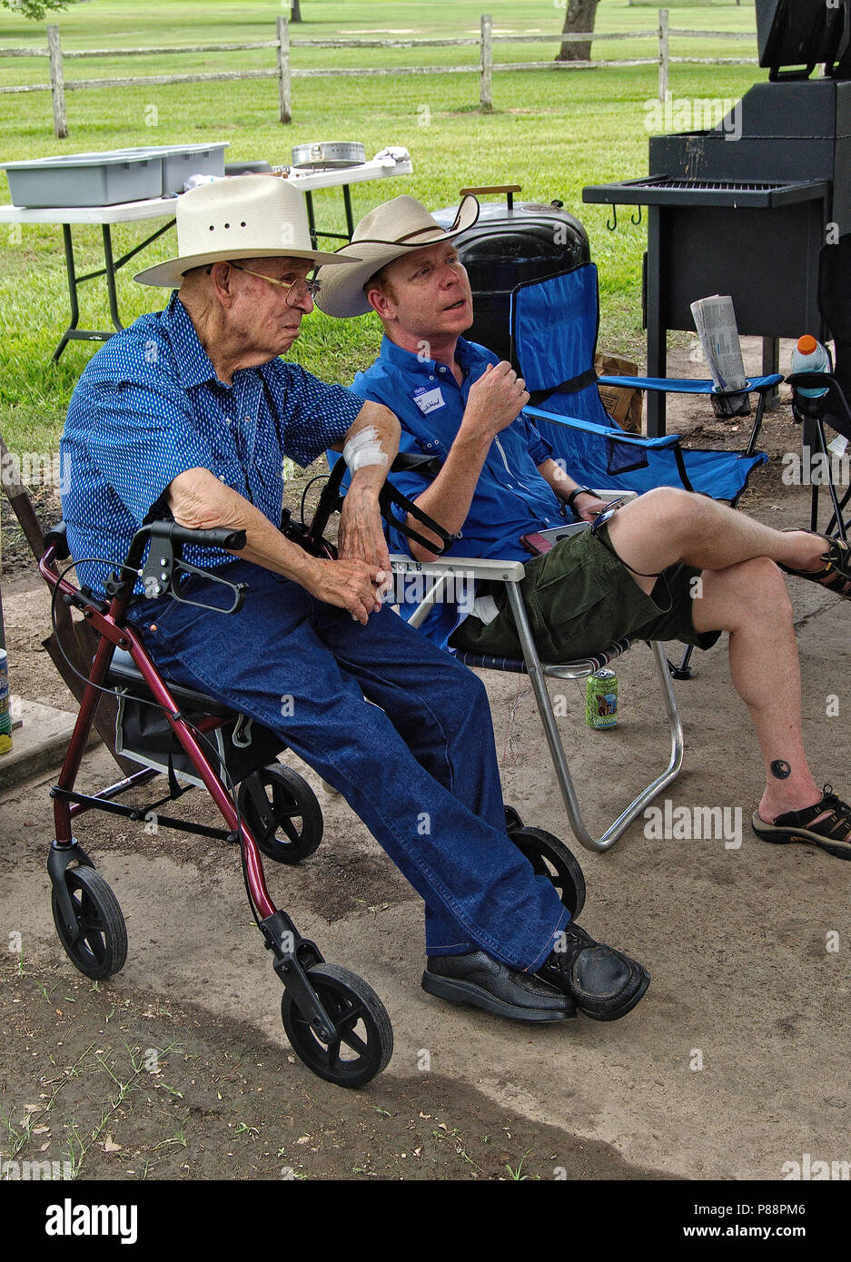 Old man sitting on walker hi-res stock photography and images - Alamy