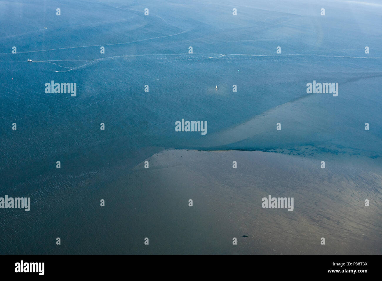 Luchtfoto van Waddenzee met boten; Aerial photo of Wadden Sea with ...