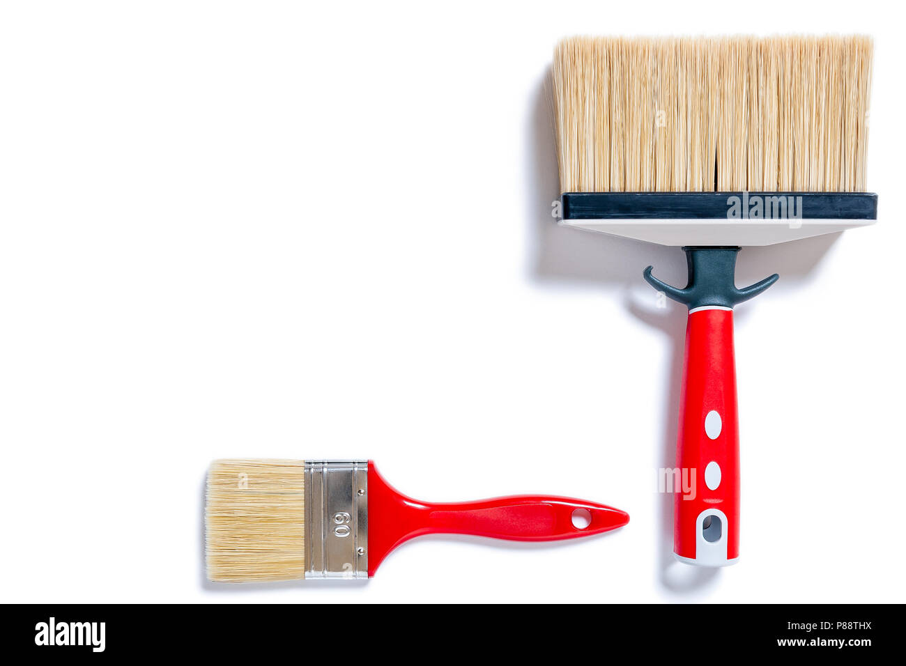 Top view of working brushes for professional house painter ...