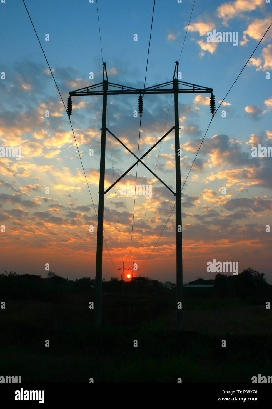 transmission power line on sunset Stock Photo - Alamy