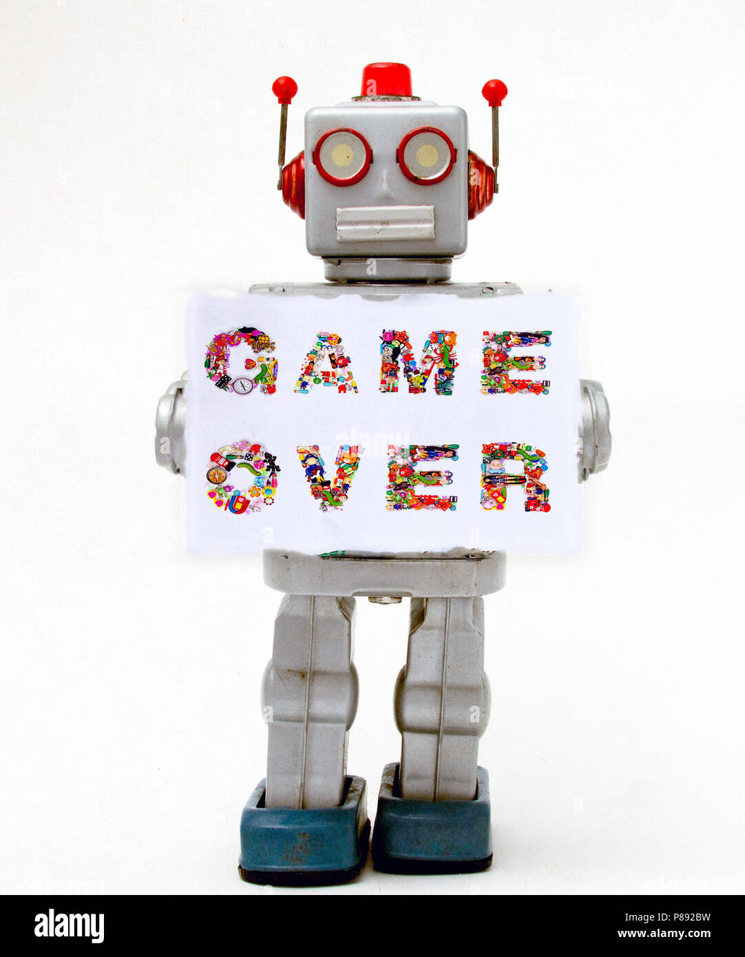 robot holing a sign GAME OVER with a white background Stock Photo - Alamy