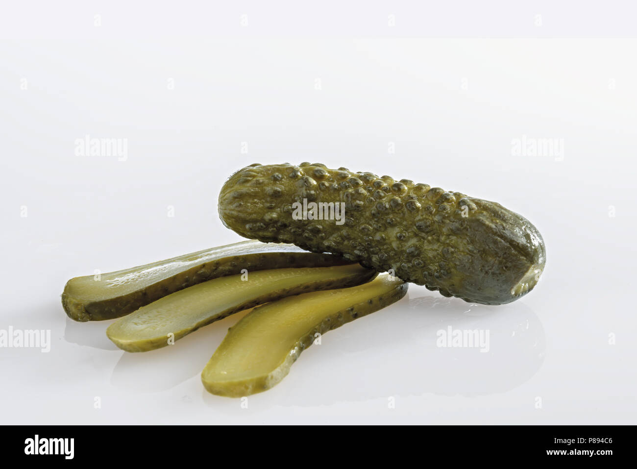 gherkin pickle germinated from below 2 Stock Photo - Alamy