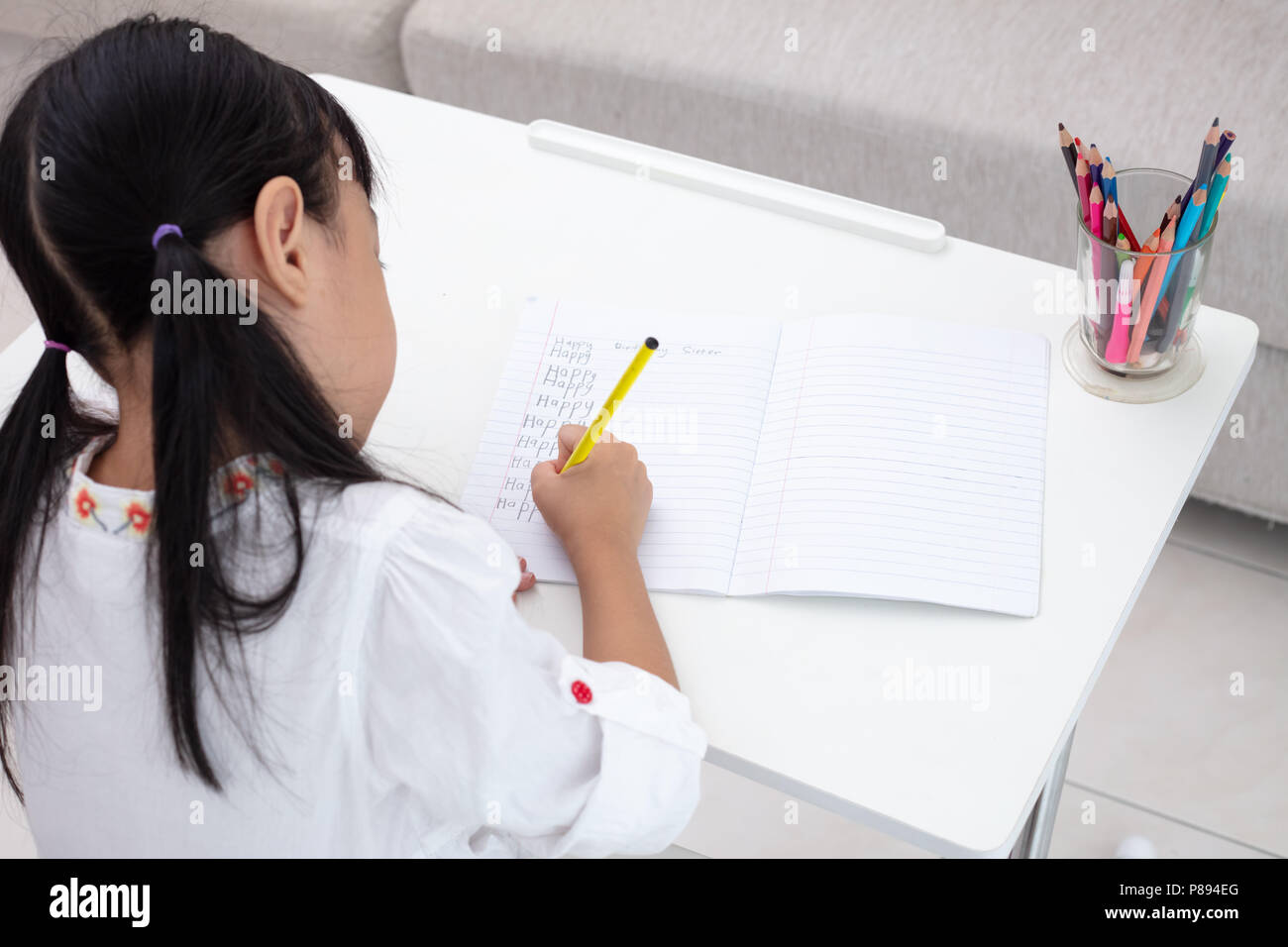 Chinese Girl Doing Homework Table High Resolution Stock Photography and ...