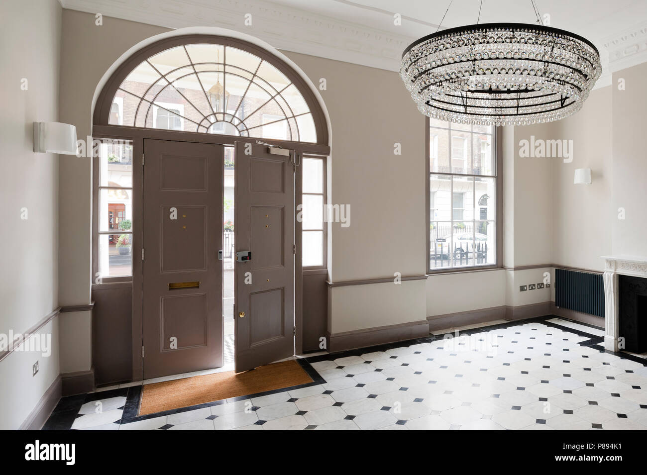 Large pendant light and double door Stock Photo - Alamy