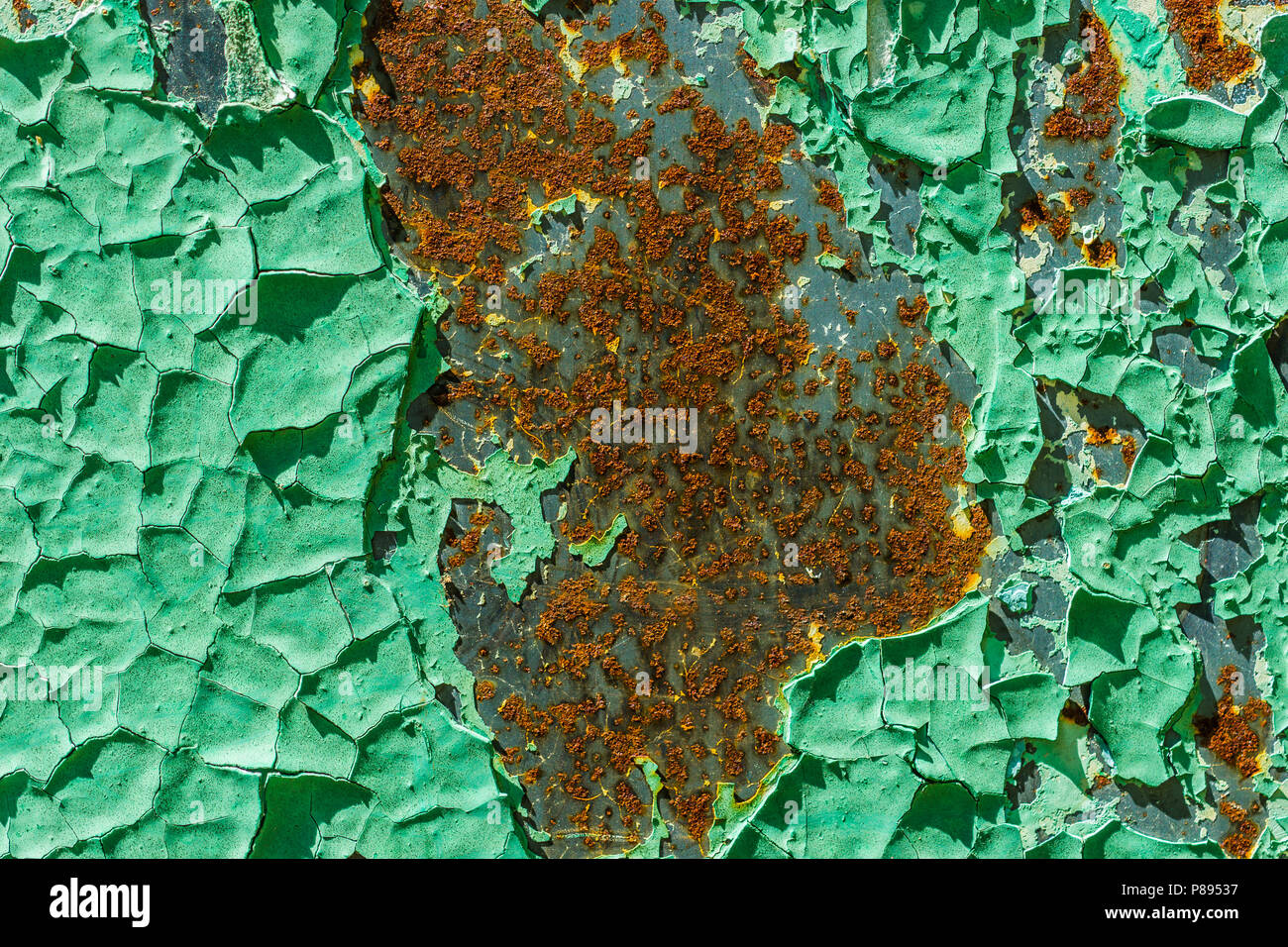 Old, rusty metal surface with peeled off and cracked green paint and ...