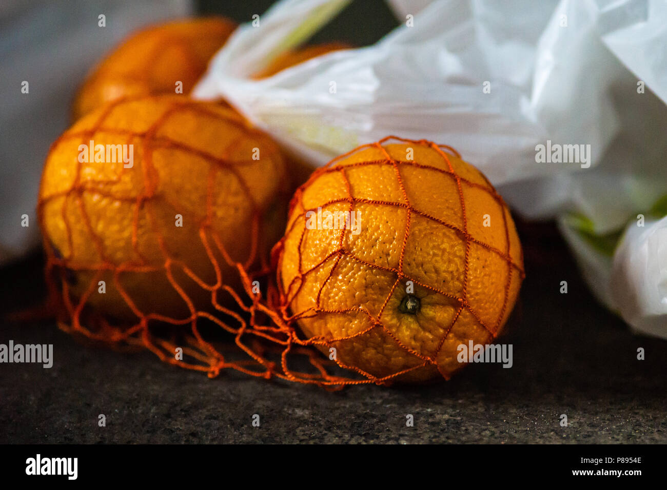 Plastic fruit netting hi-res stock photography and images - Alamy