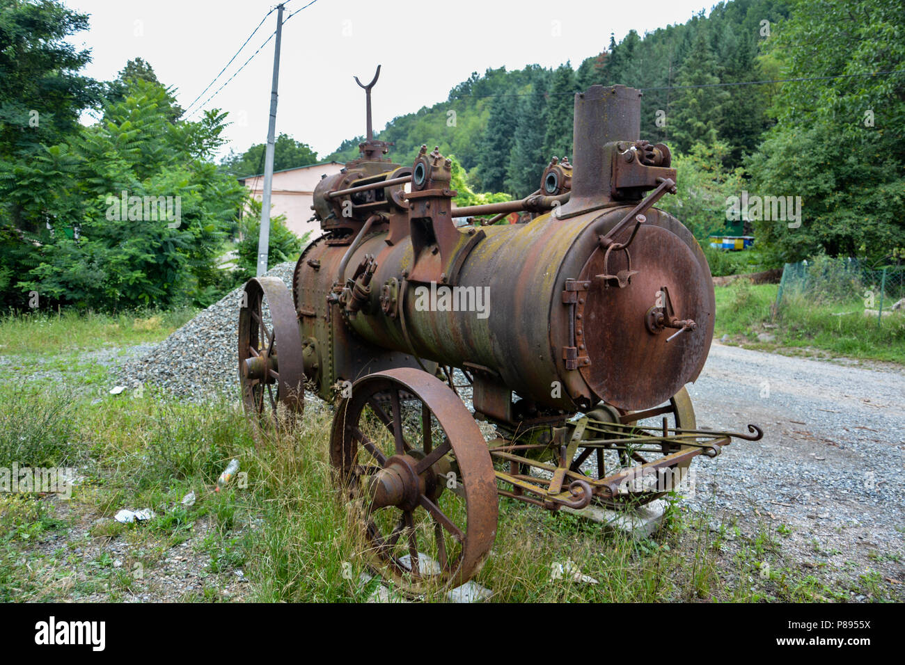 Old and rustic steam train or tractor used in Serbia in 1920's and 1930 ...