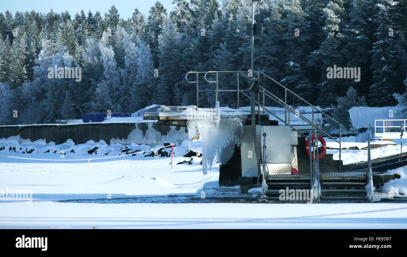 Sauna ice swim Stock Photo - Alamy