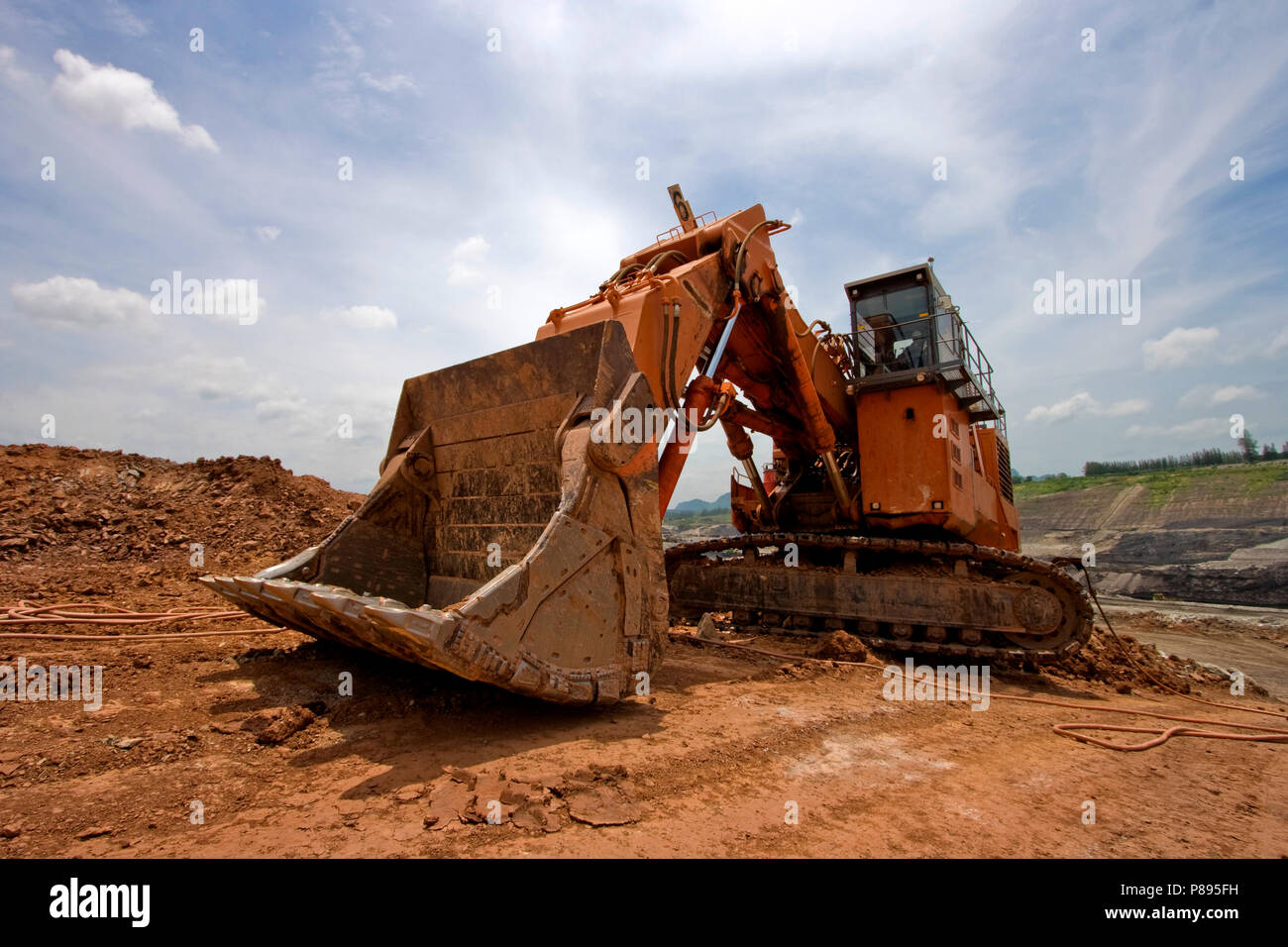 track-type loader excavator machine doing earthmoving Stock Photo - Alamy