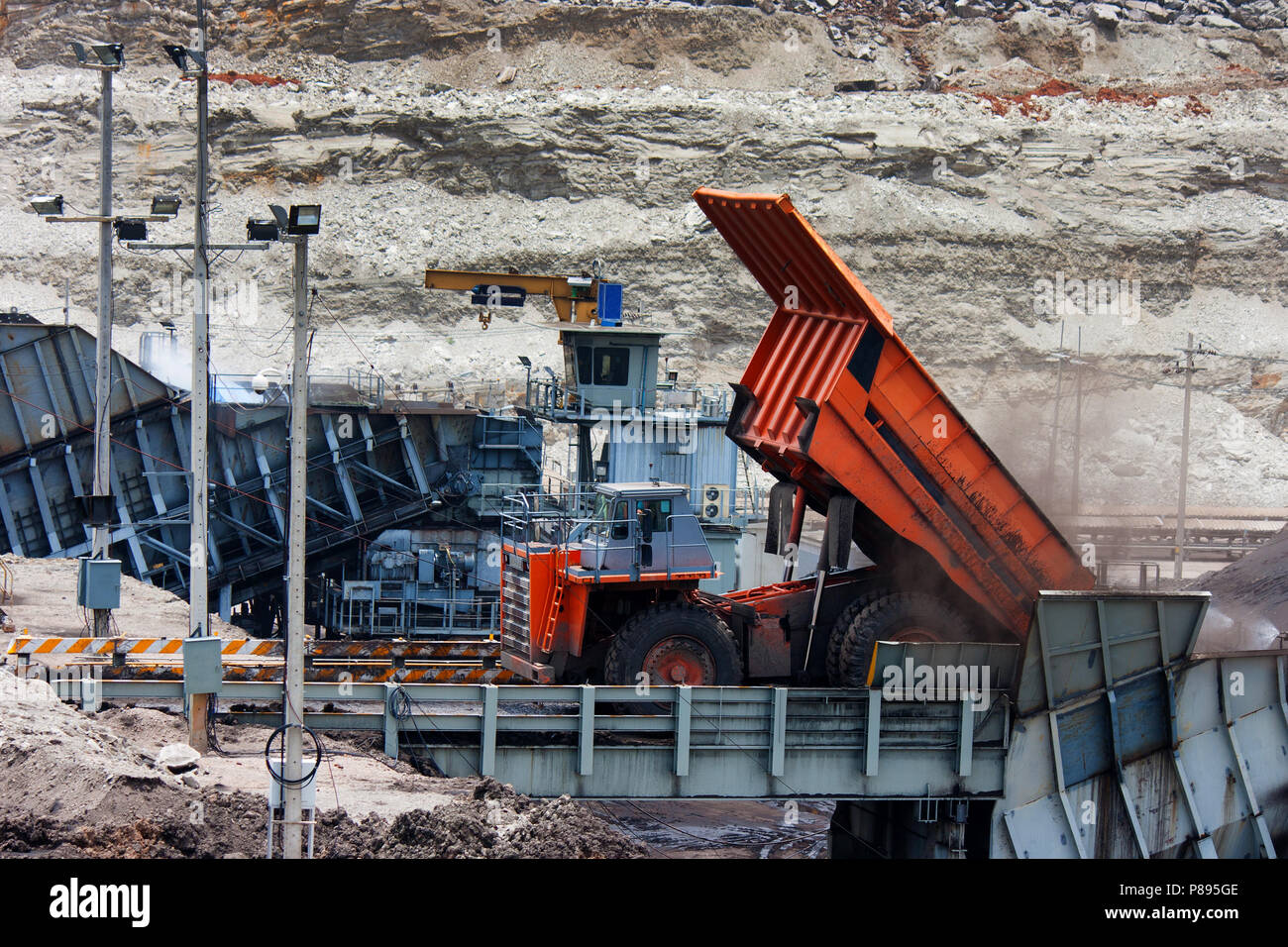 big mining truck unload coal Stock Photo - Alamy