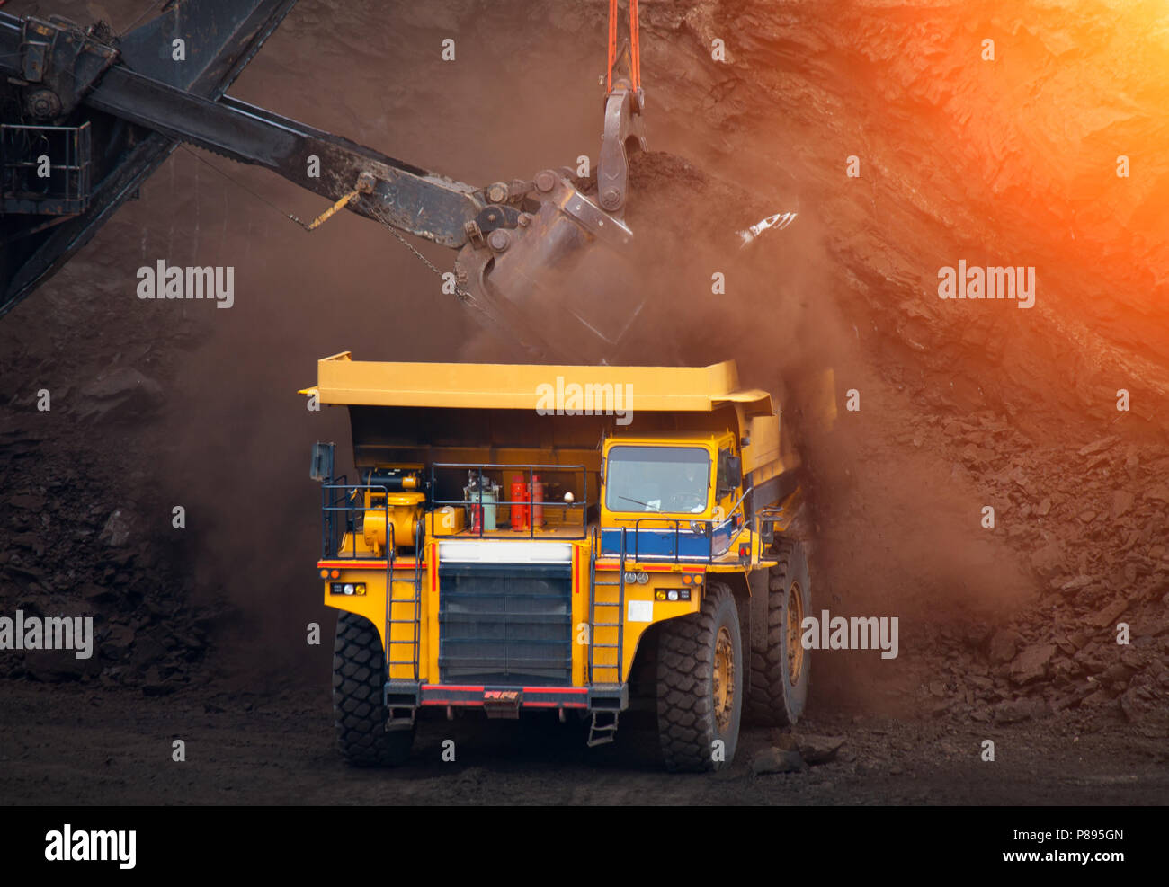 big mining truck unload coal in coal mining, mining production, mining ...