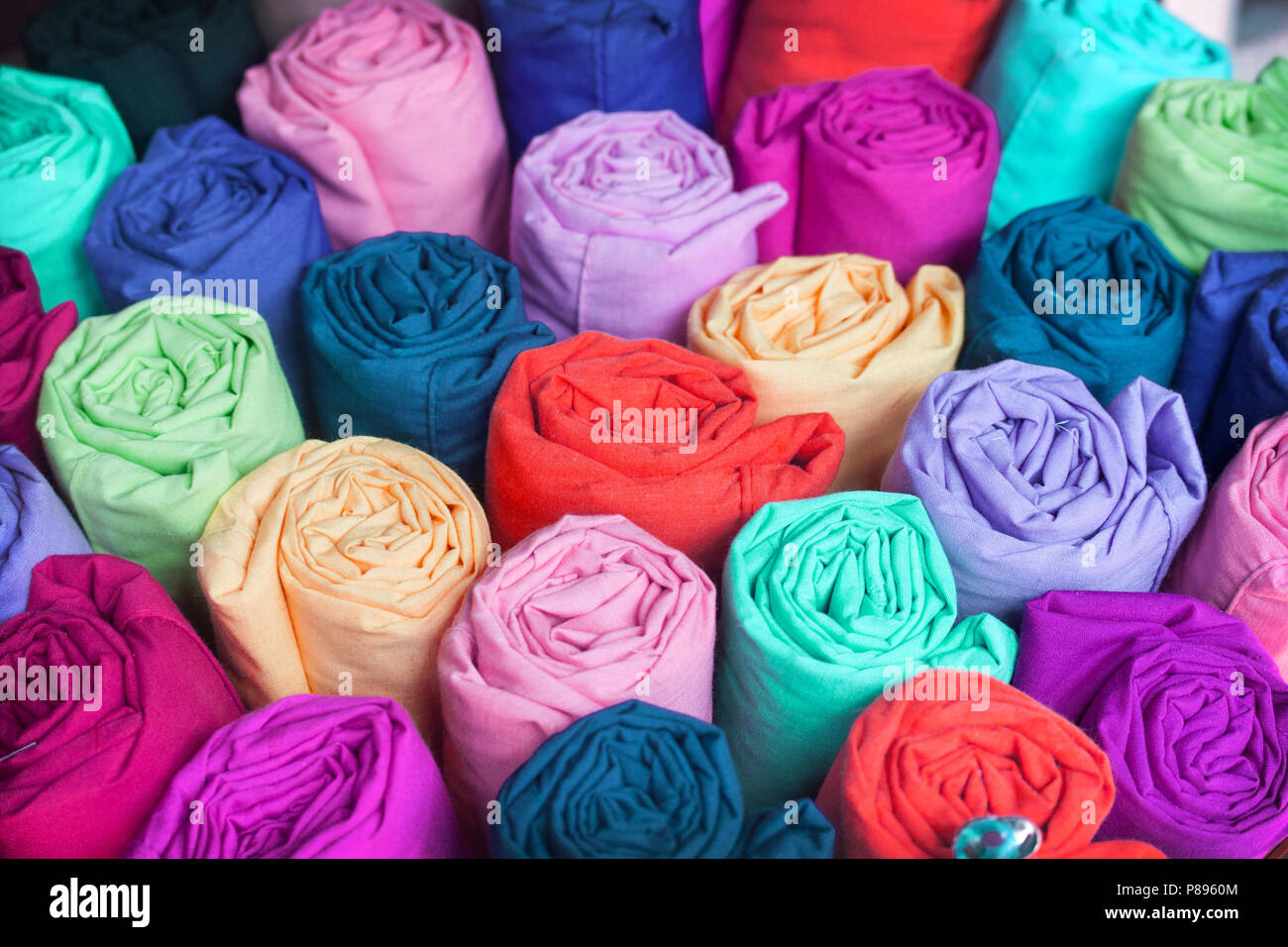Colorful fabric roll. fabric Industry popular in many countries. You ...