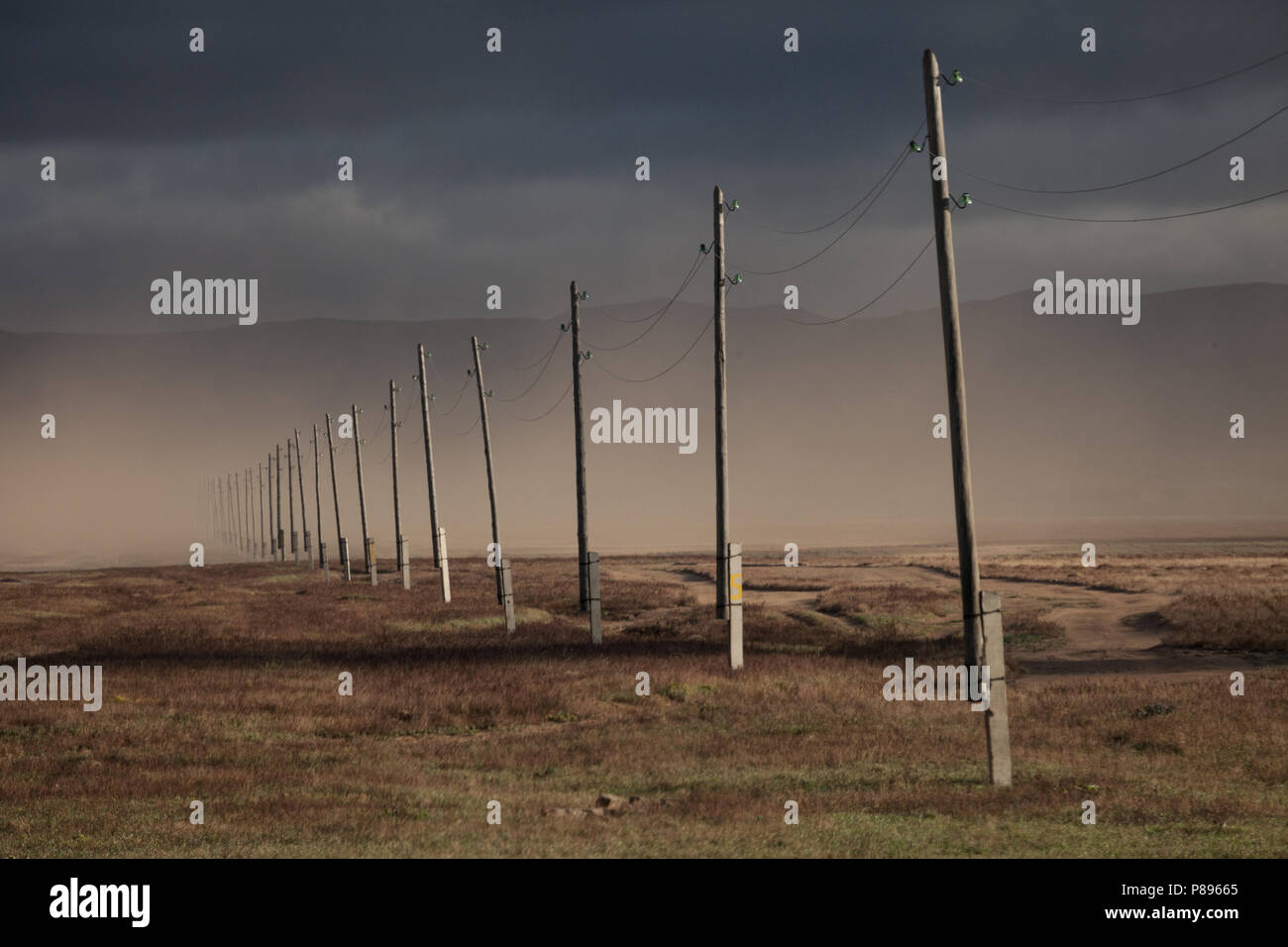 a view of a field with electrical system Stock Photo - Alamy