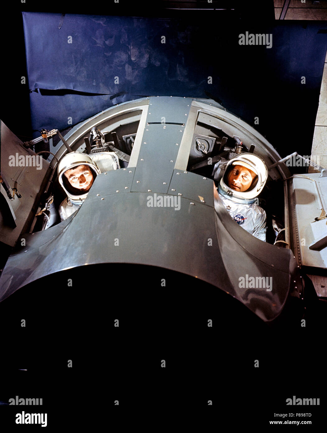 American astronauts inside space capsule Stock Photo - Alamy