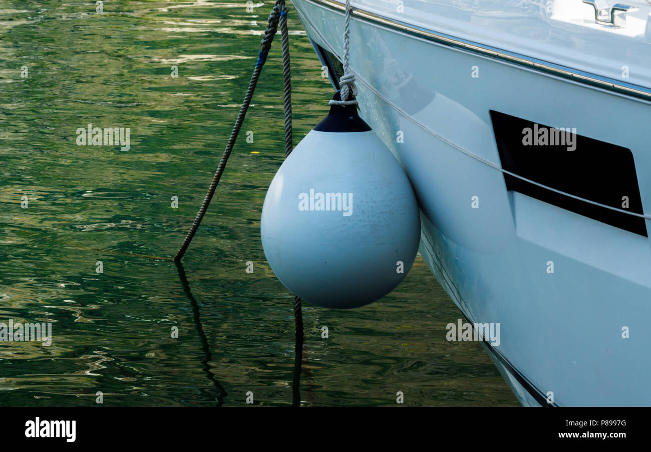 buoy hanging outside the hull of the boat, boat equipment, safety at ...
