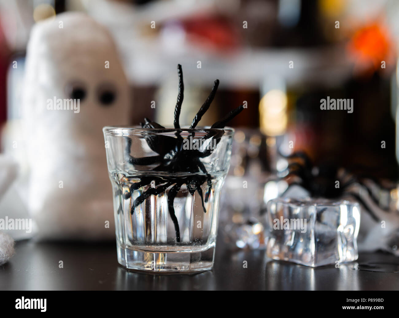 creepy halloween party cocktails with syringes of grenadine syrup as ...