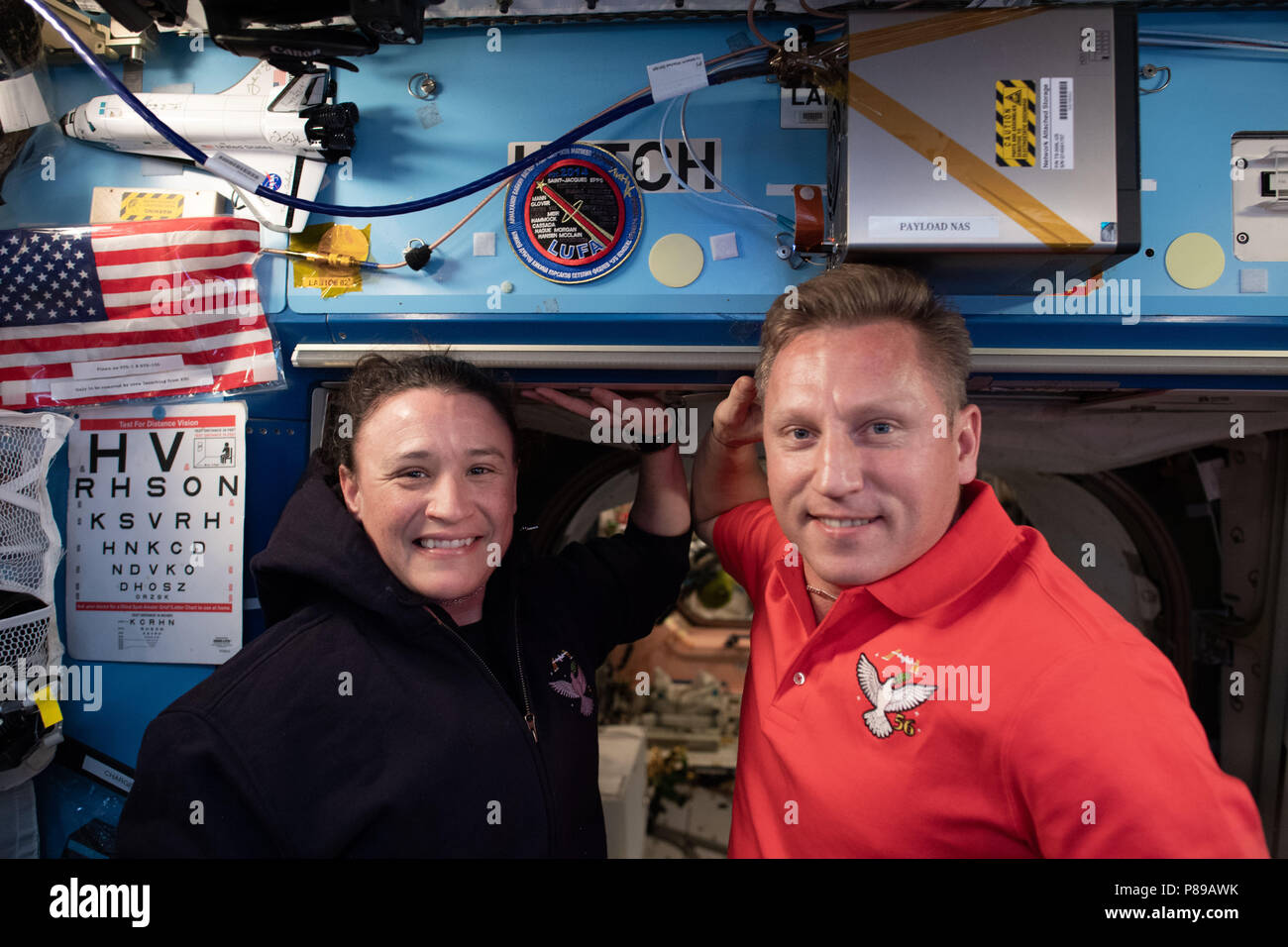Expedition 57 crew members Serena Aunon-Chancellor of NASA, left, and ...