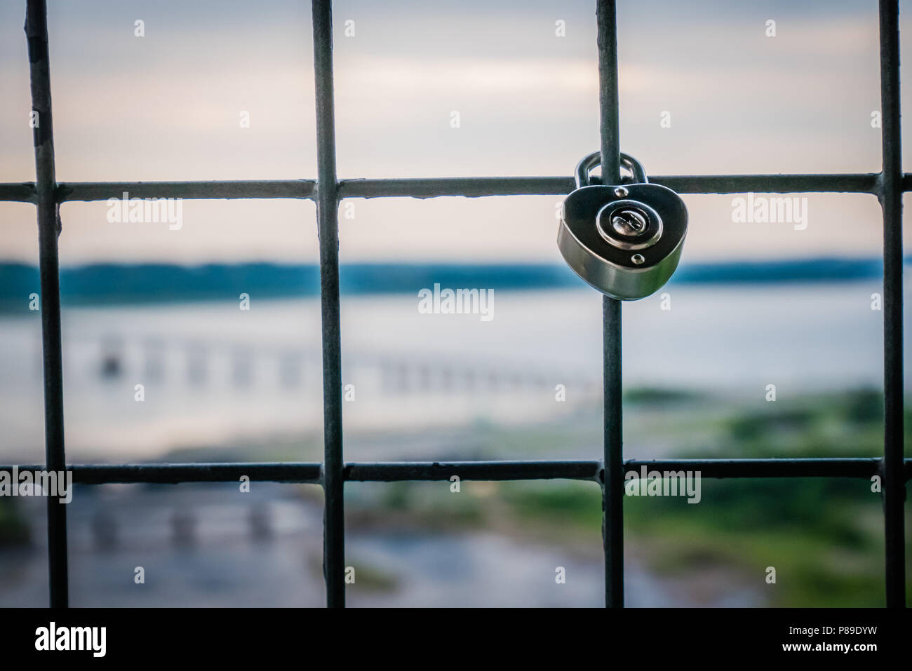 small heart shaped lock metal fence Stock Photo - Alamy