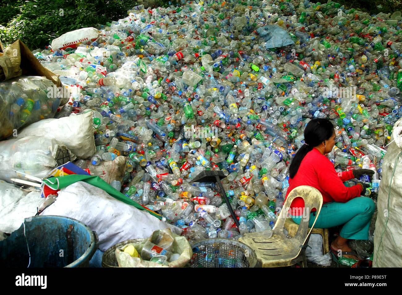 ANGONO, RIZAL, PHILIPPINES - JULY 4 2018: Workers of a materials ...