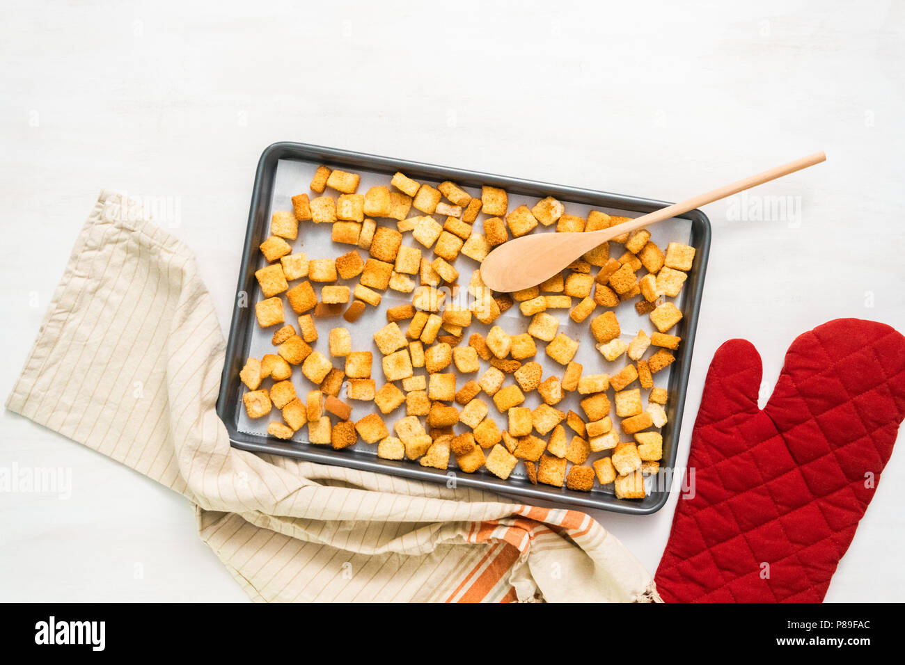 Fresh french toast croutons on baking sheet Stock Photo - Alamy