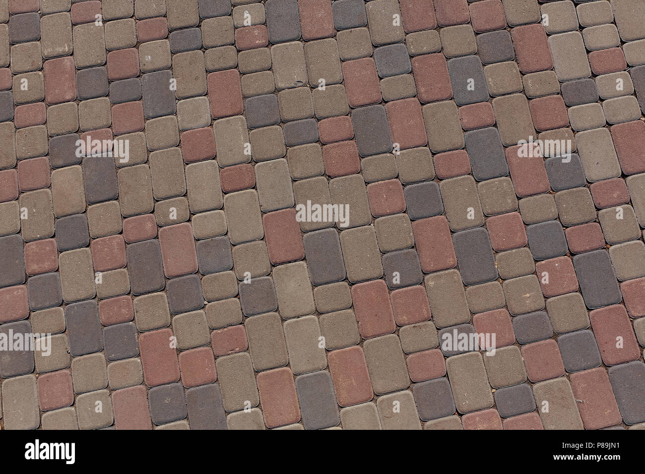Colored stone blocks paving texture and background Stock Photo - Alamy
