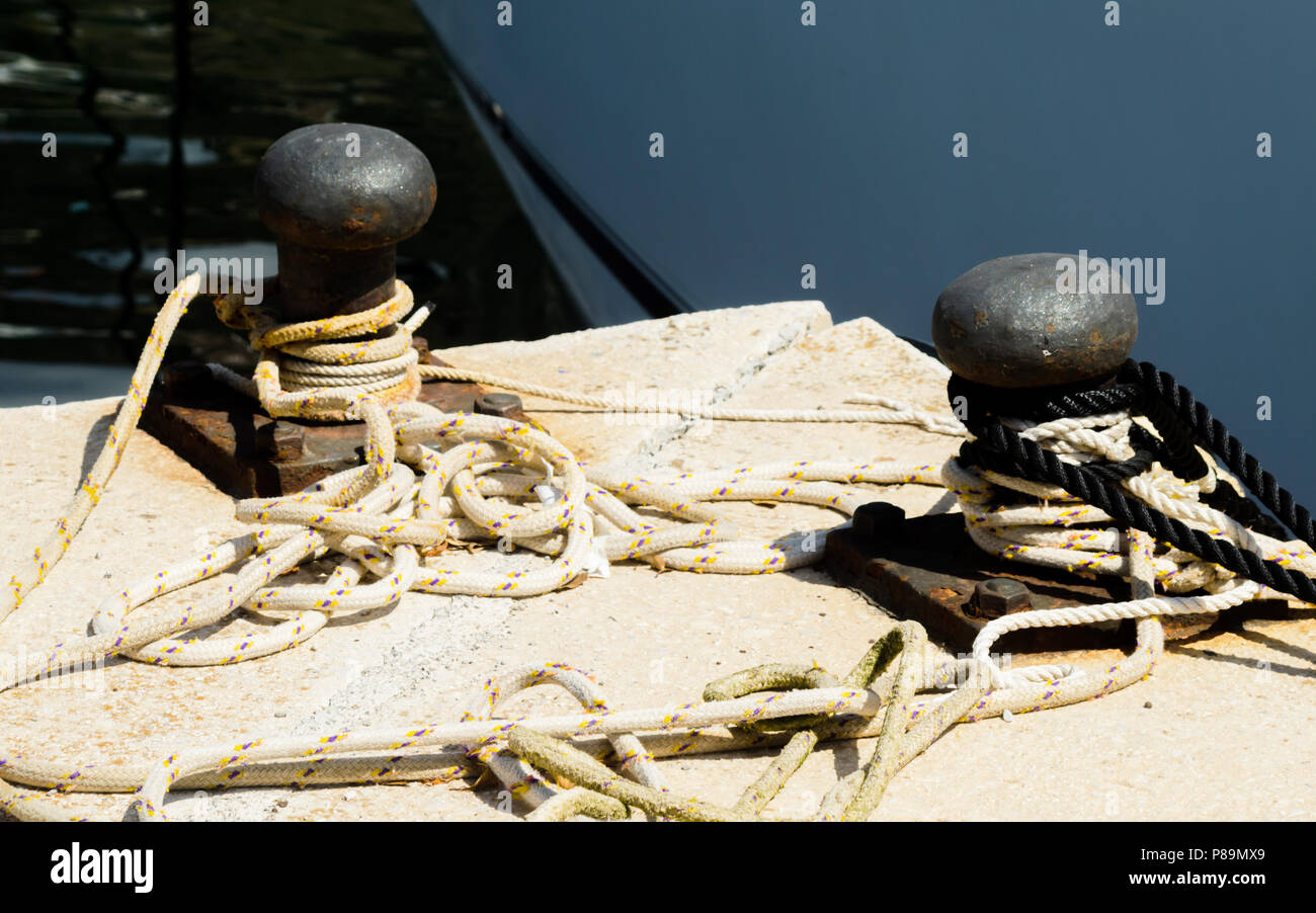 mooring post on the waterfront in a small marina, element for mooring ...