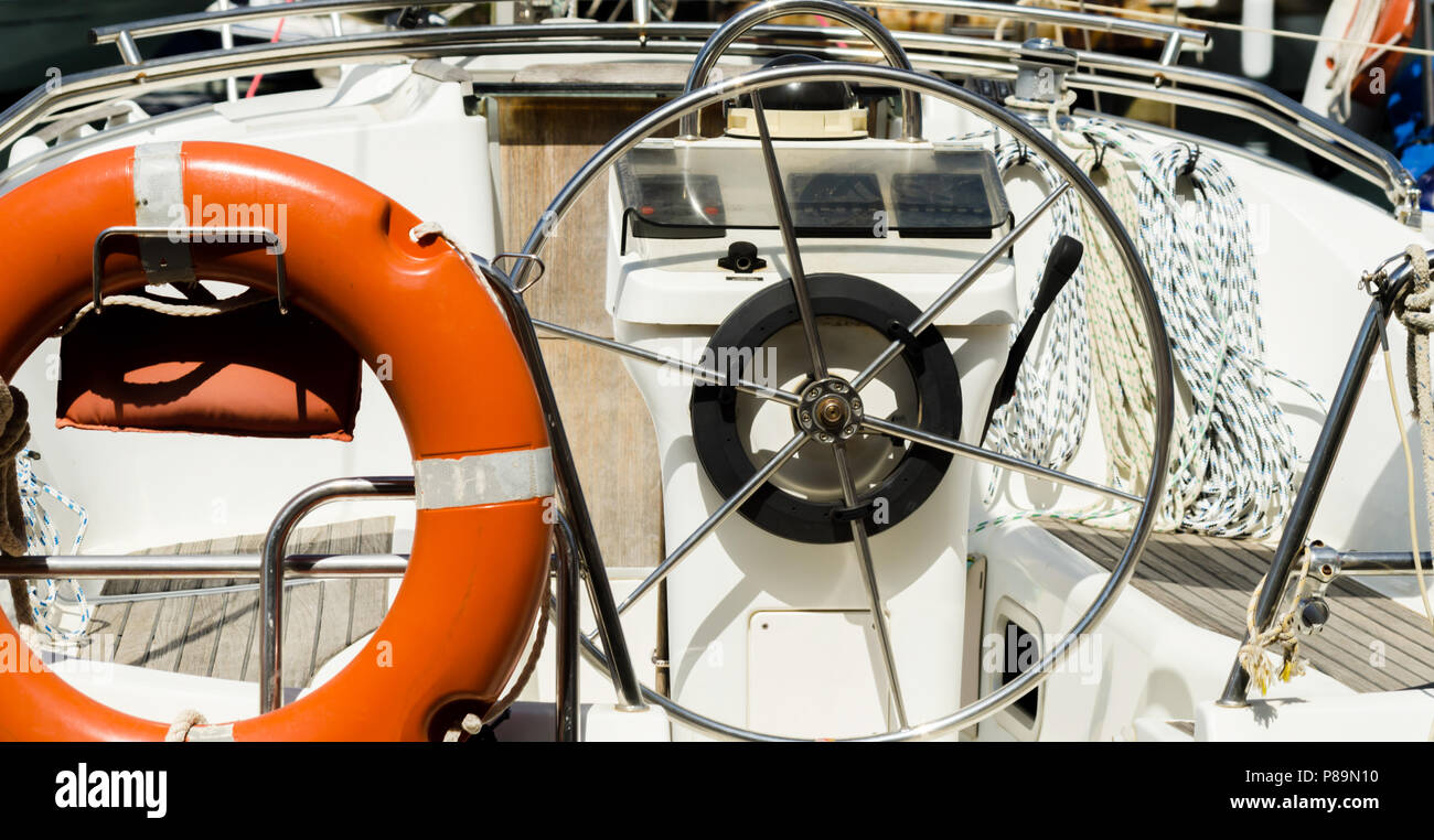 Orange lifebuoy on the side of the boat, an essential tool life-saving ...