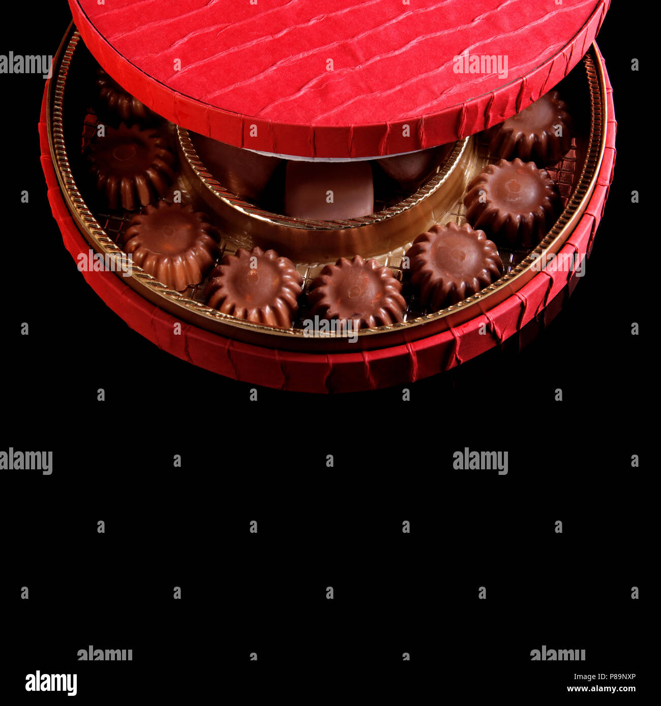 close up shot of chocolates in box Stock Photo - Alamy