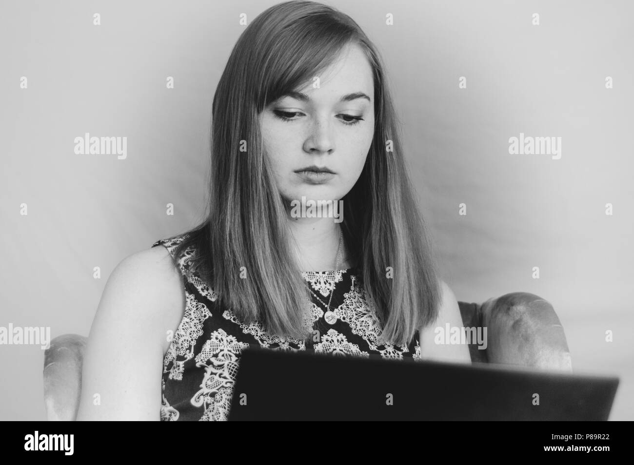 Woman looking at computer hi-res stock photography and images - Alamy