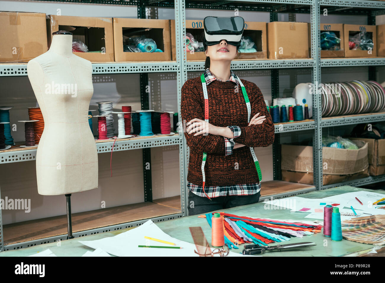 Asian woman crossed her hands and wearing the VR headset. She can see ...