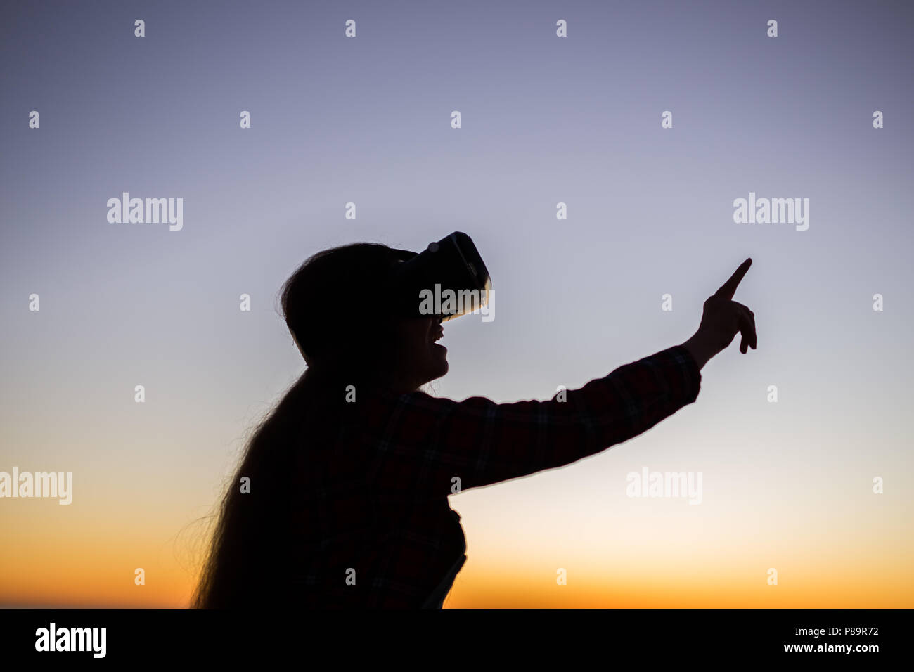 Virtual Realty is here Man wearing virtual reality glasses on the over ...