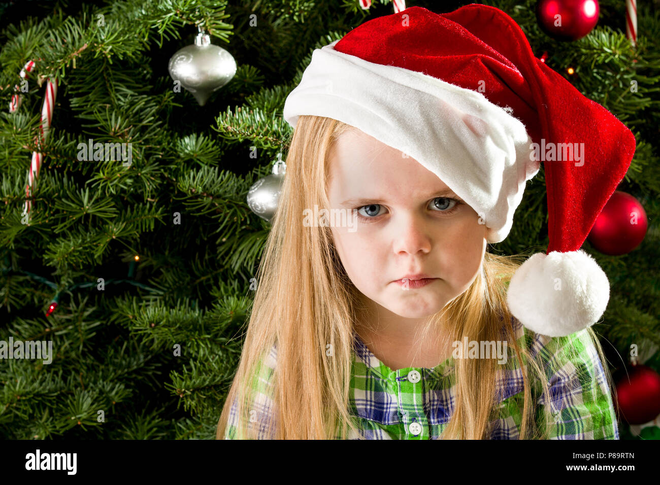 She didn't get what she wnated for christmas and has a sad face Stock ...