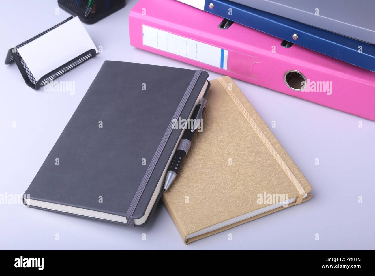 Folder file, note and pen on the desk. blurred background Stock Photo ...