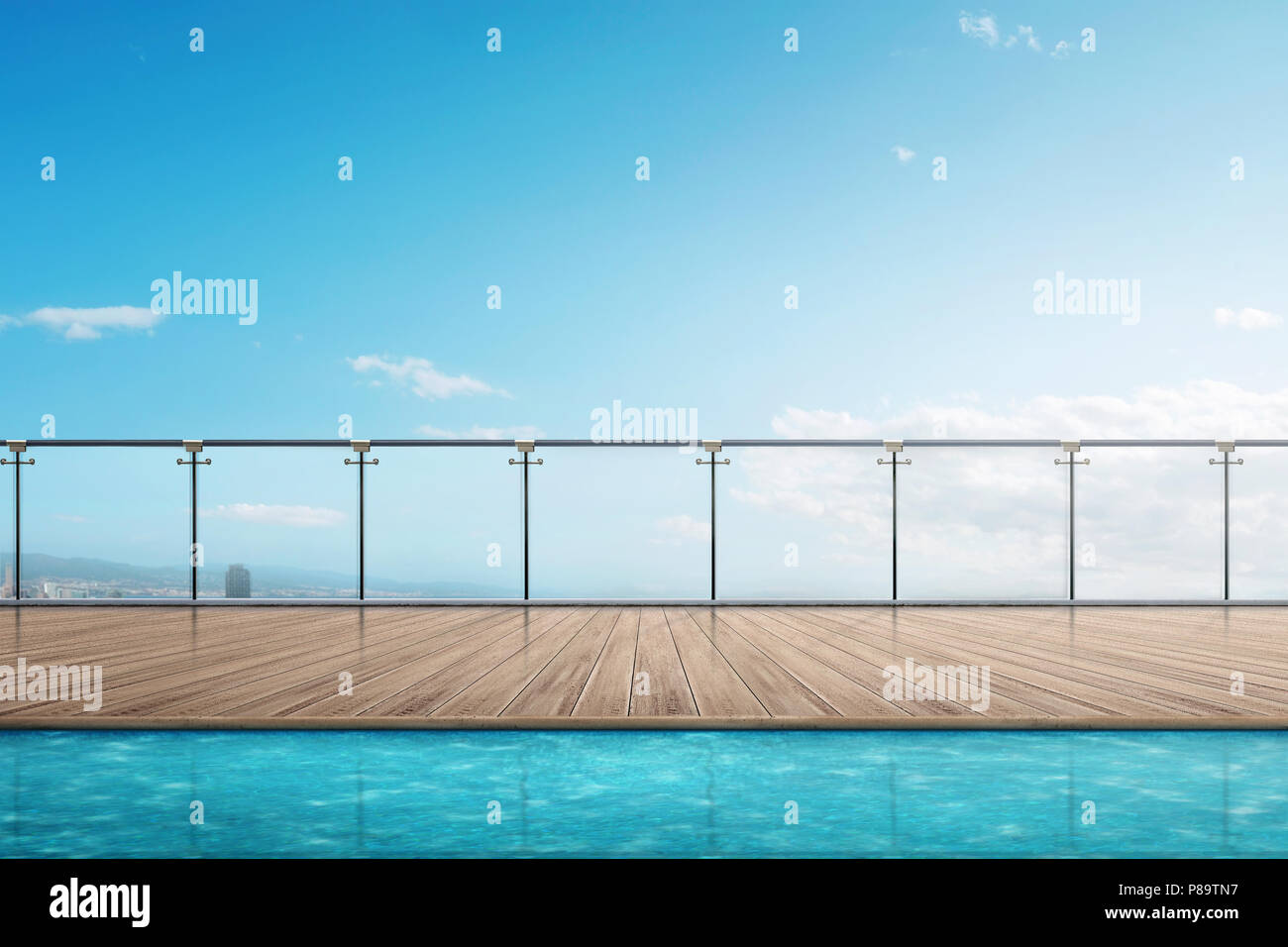 The edge swimming pool on the building balcony with blue sky background ...