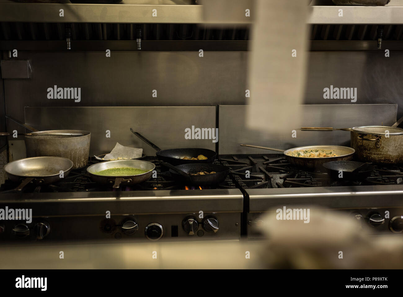 Food being prepared in kitchen Stock Photo - Alamy