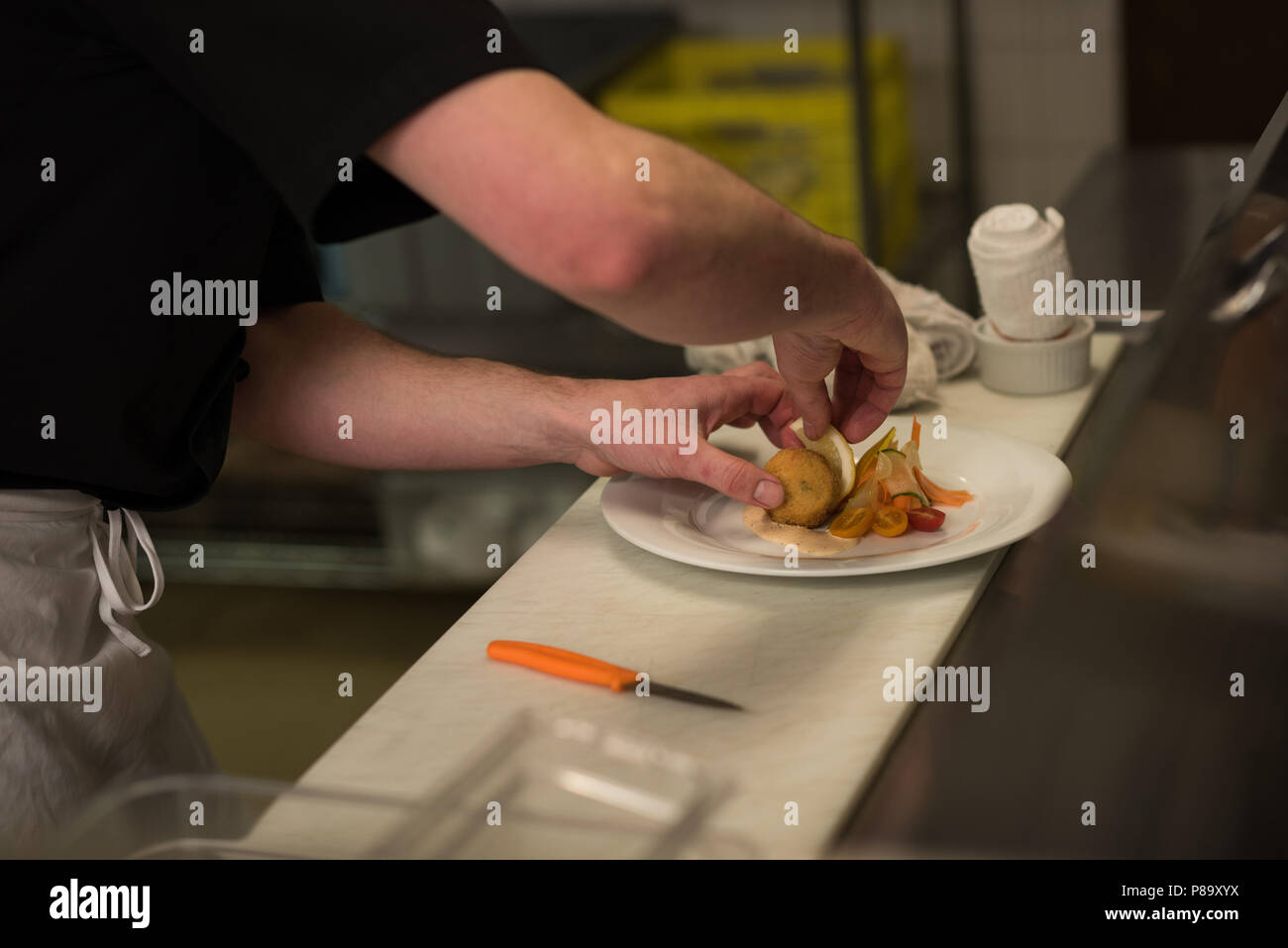 Chef serving food hi-res stock photography and images - Alamy