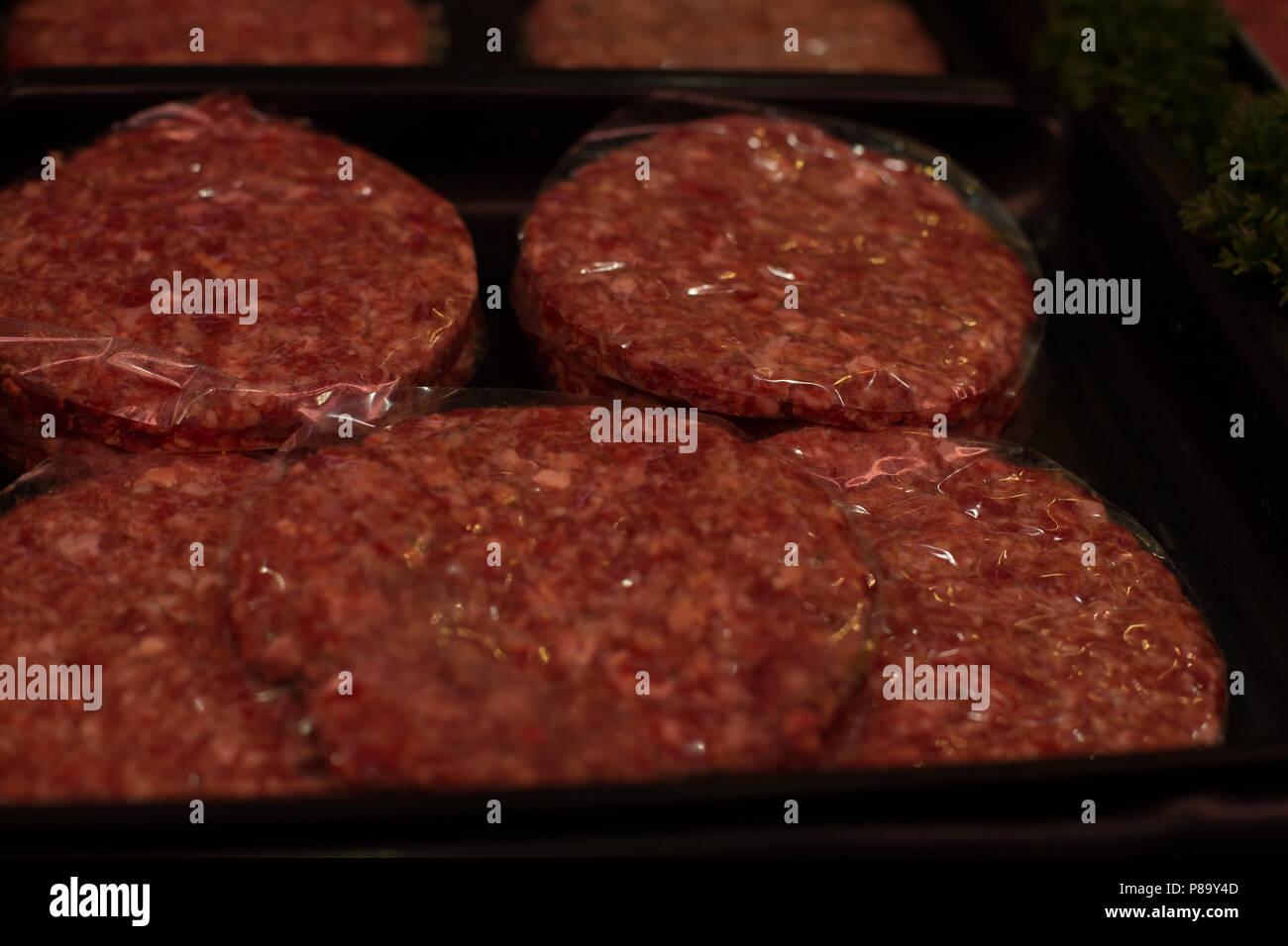 Packed meat in butcher shop Stock Photo - Alamy