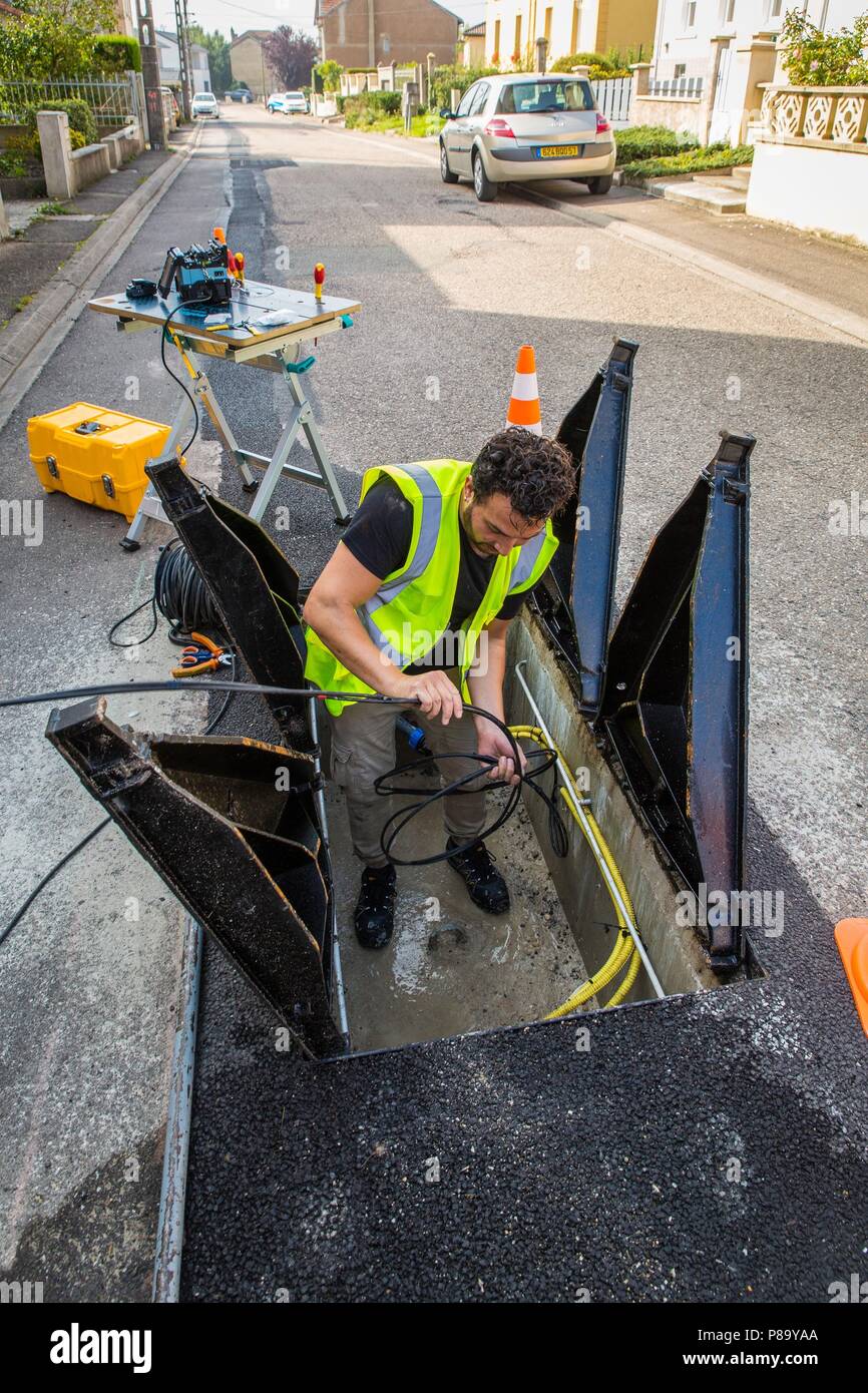 Installation Of Cable Fiber Optic Network Stock Photos & Installation ...