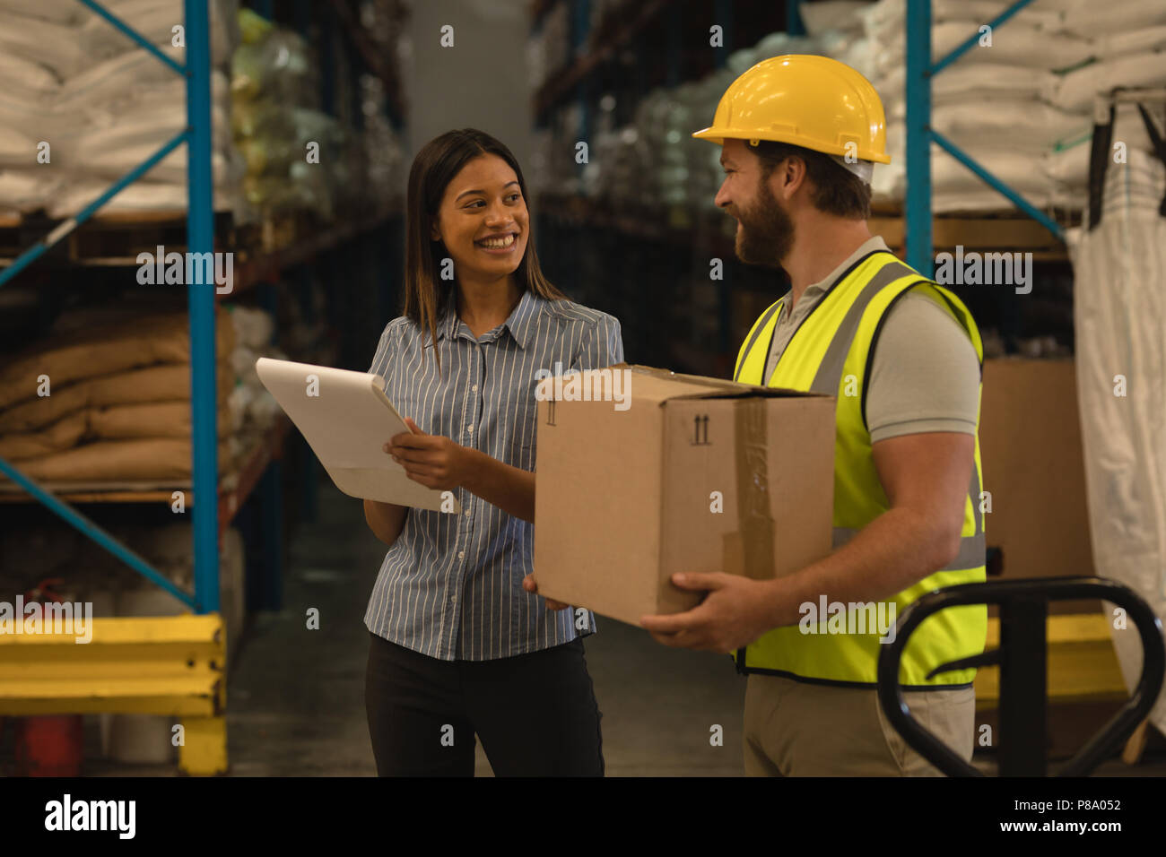 Staff interacting with each other Stock Photo - Alamy