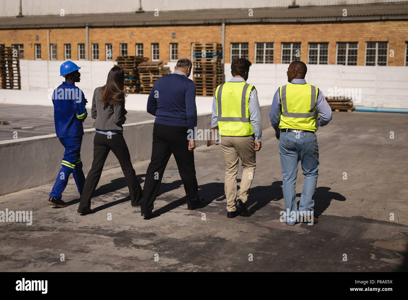 Staff walking hi-res stock photography and images - Alamy