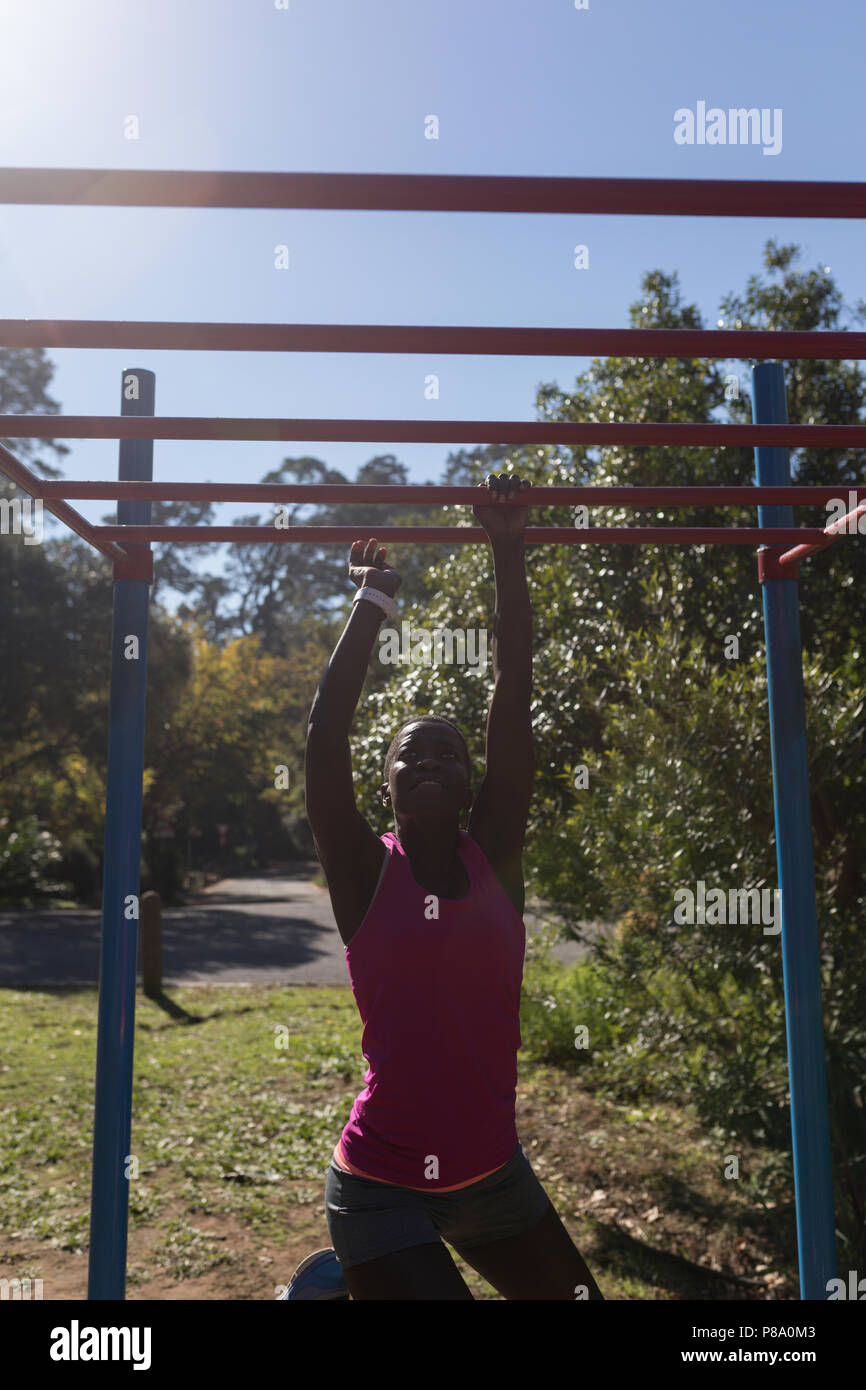 Swinging on monkey bars hi-res stock photography and images - Alamy