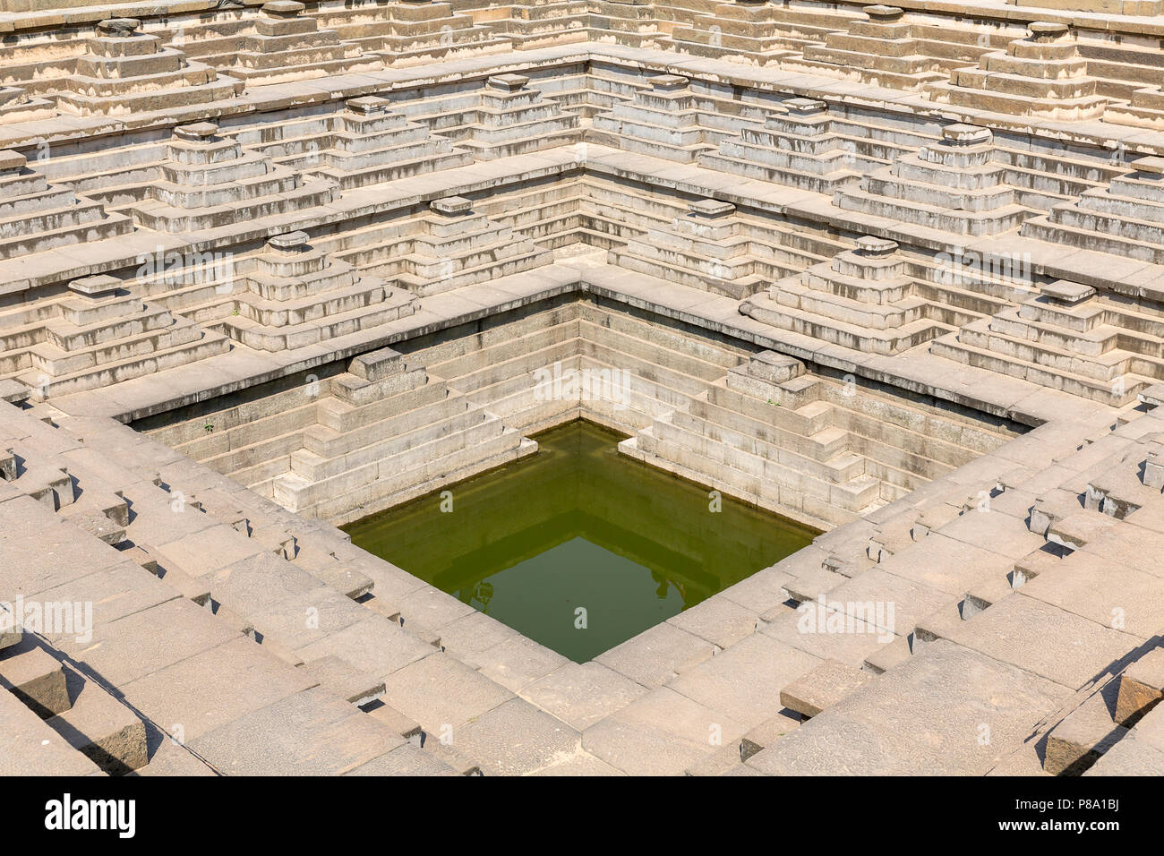 Stepped square water tank, Hampi, Karnataka, India Stock Photo - Alamy
