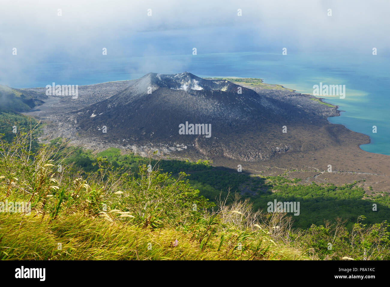 Ascent to Mount Kobui with view into the crater of the volcano Tavurvur ...