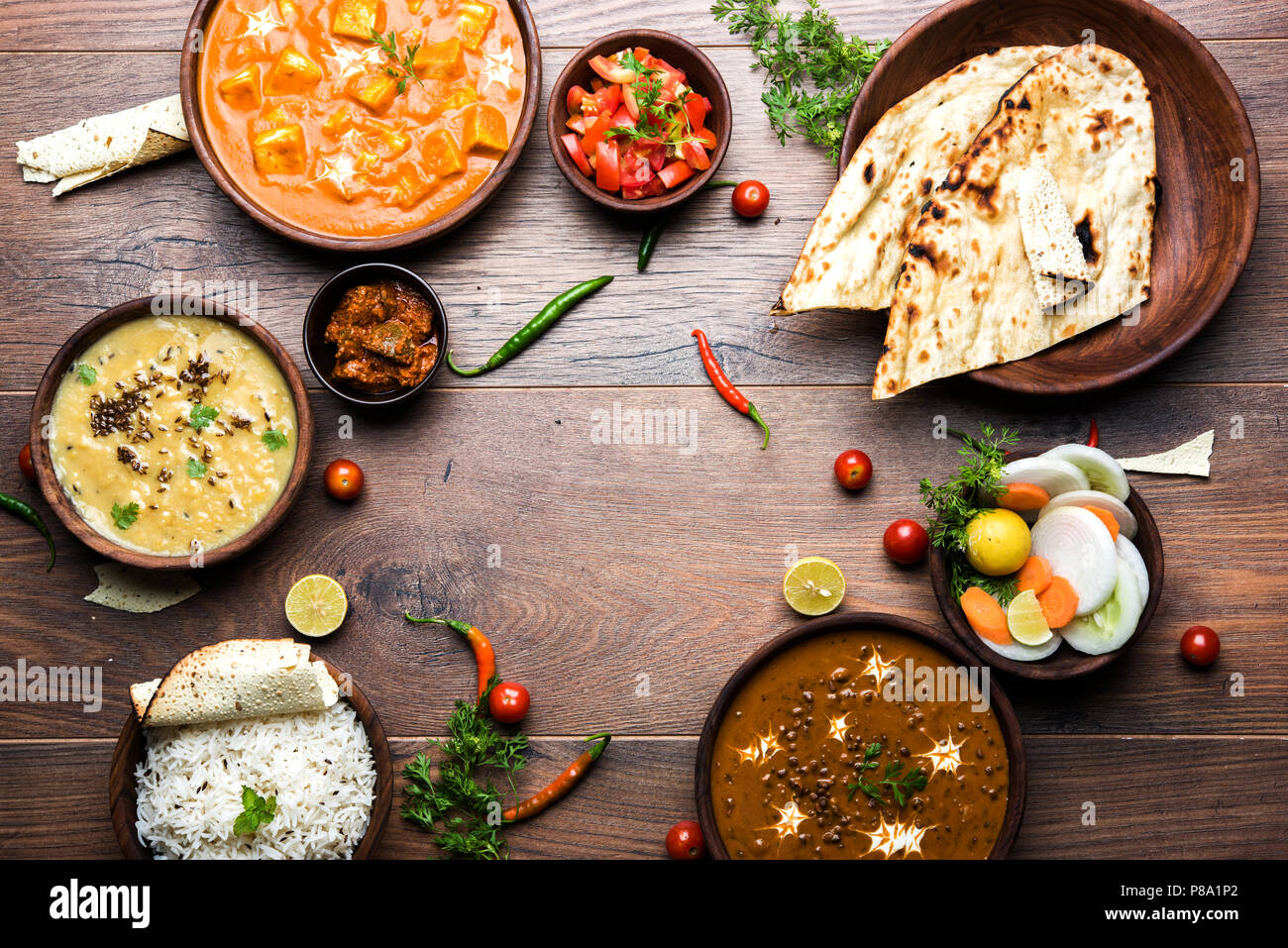 Assorted indian food for lunch or dinner, rice, lentils, paneer, dal ...