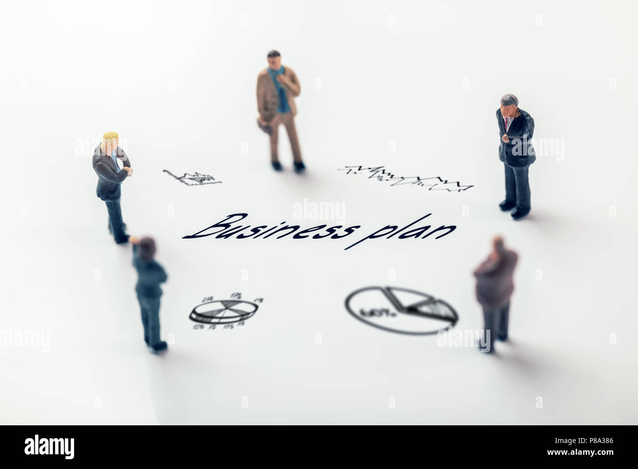 group of businessmen planning new business plan concept Stock Photo - Alamy