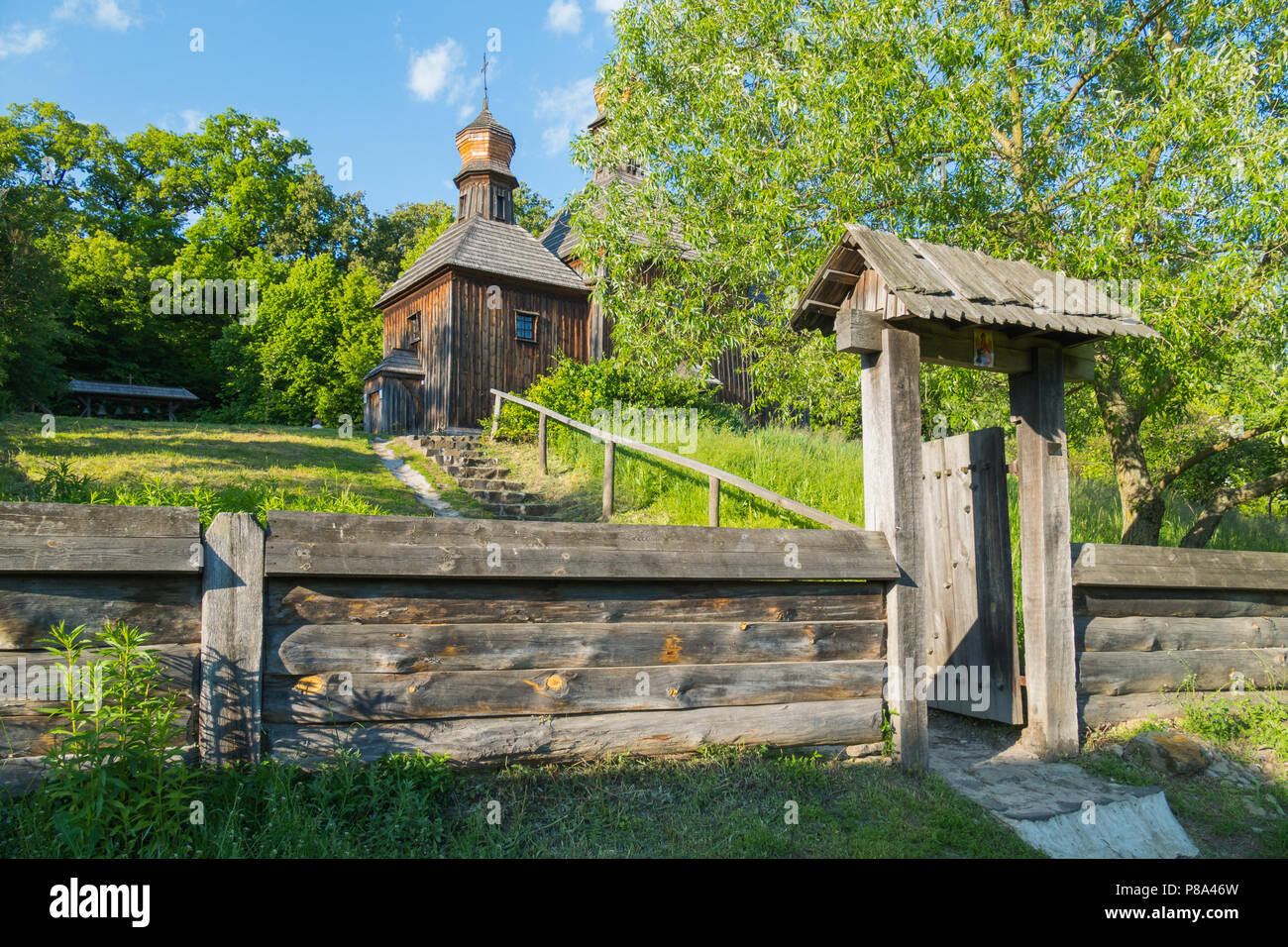 Fence with wicket and old steps leading to the entrance to the ...