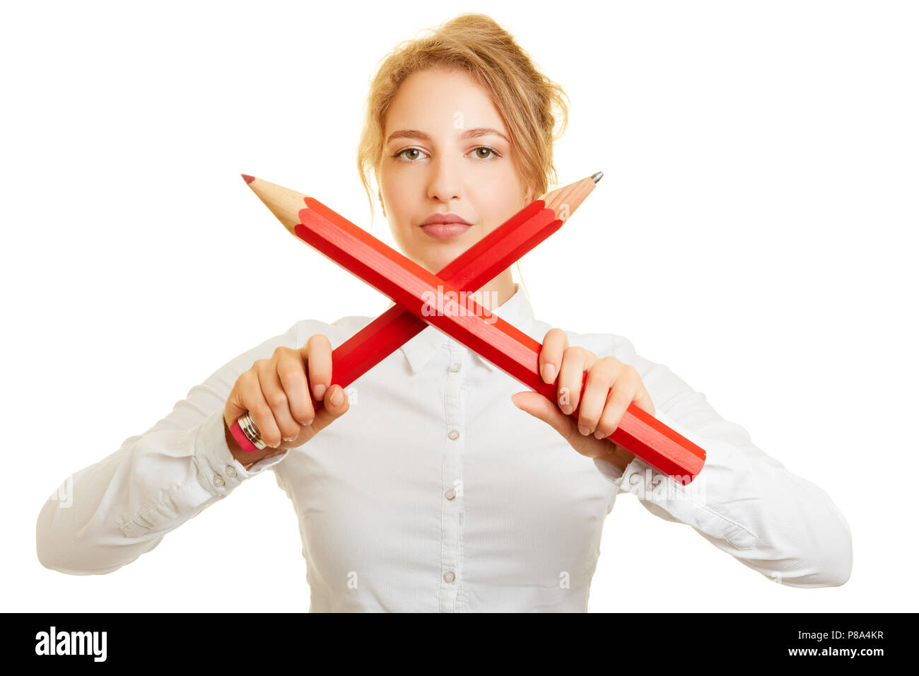 Woman holds two crossed big pins for defense and defense in the office ...